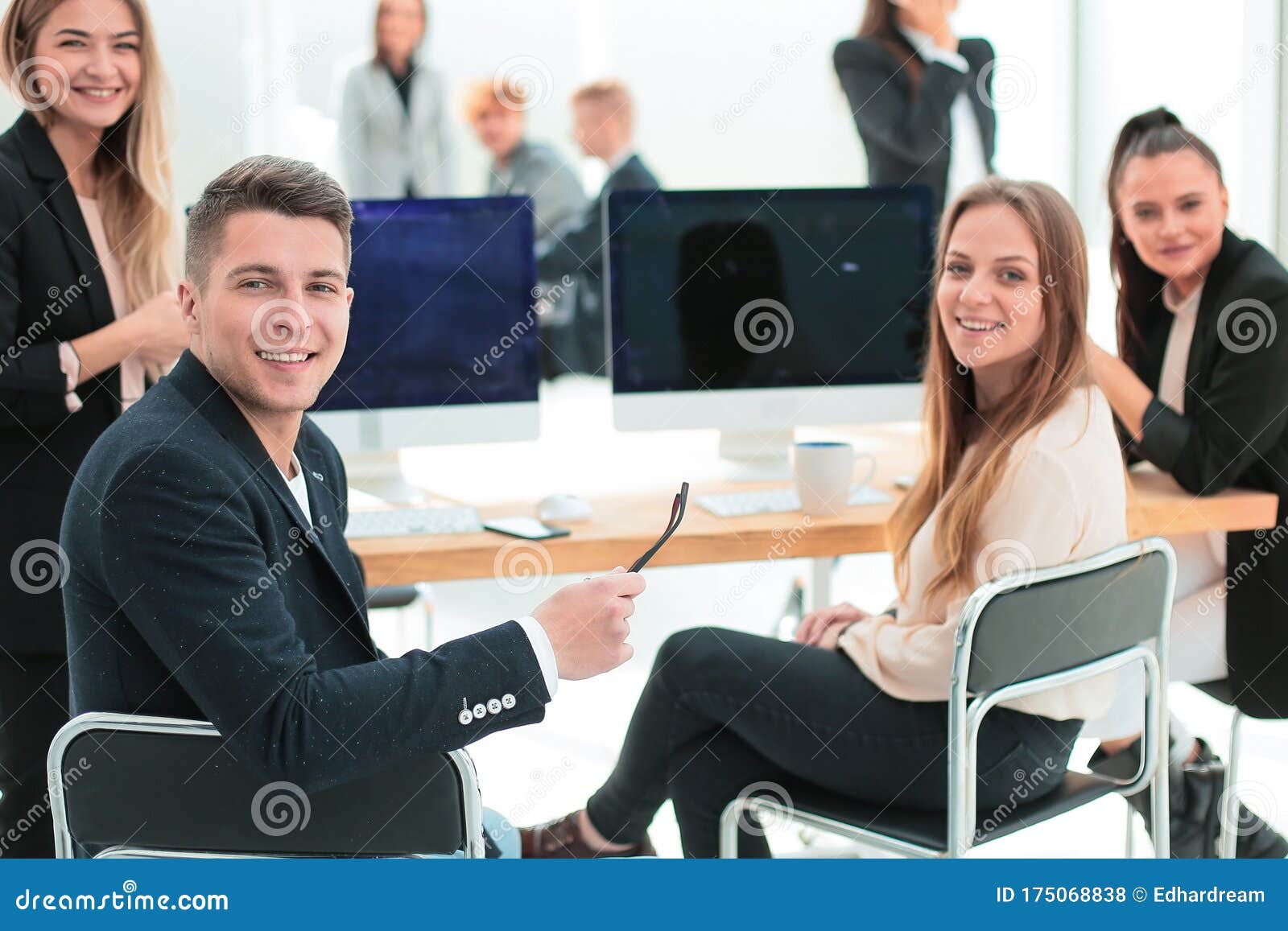 Group of Young Employees in the Workplace Stock Photo - Image of ...