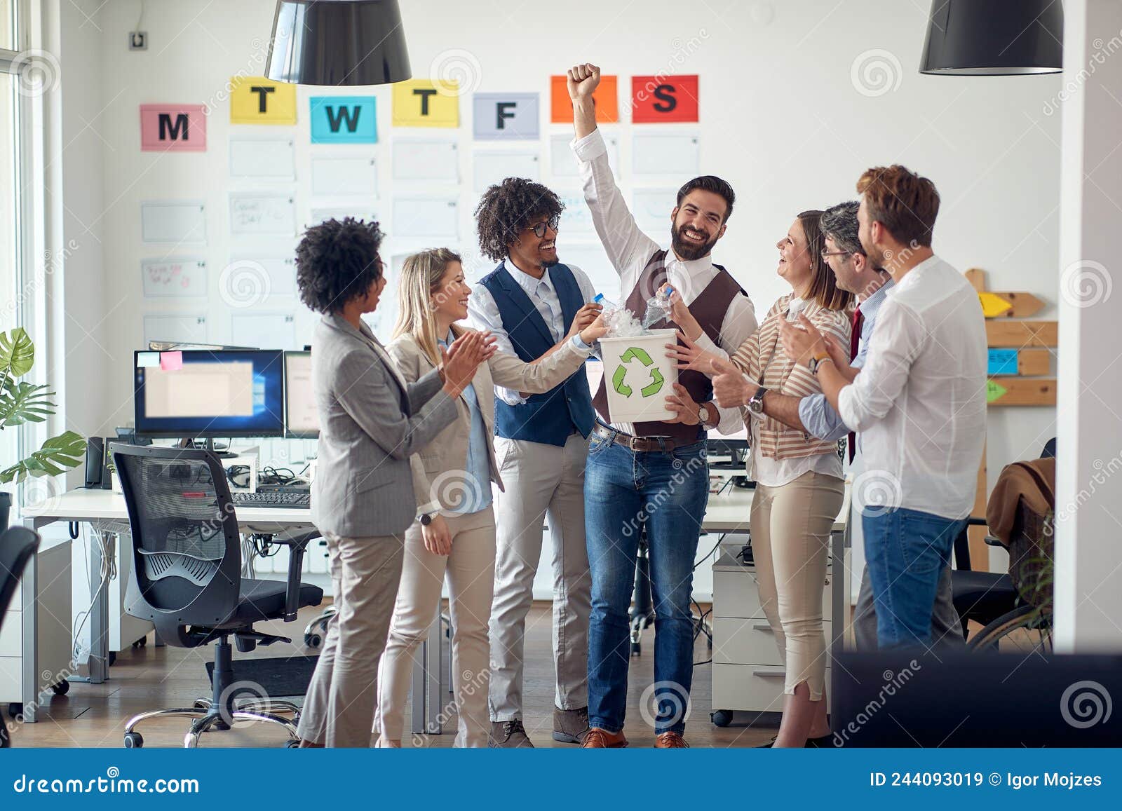 Group of Young Environmentally Focused Employees Recycling Together ...