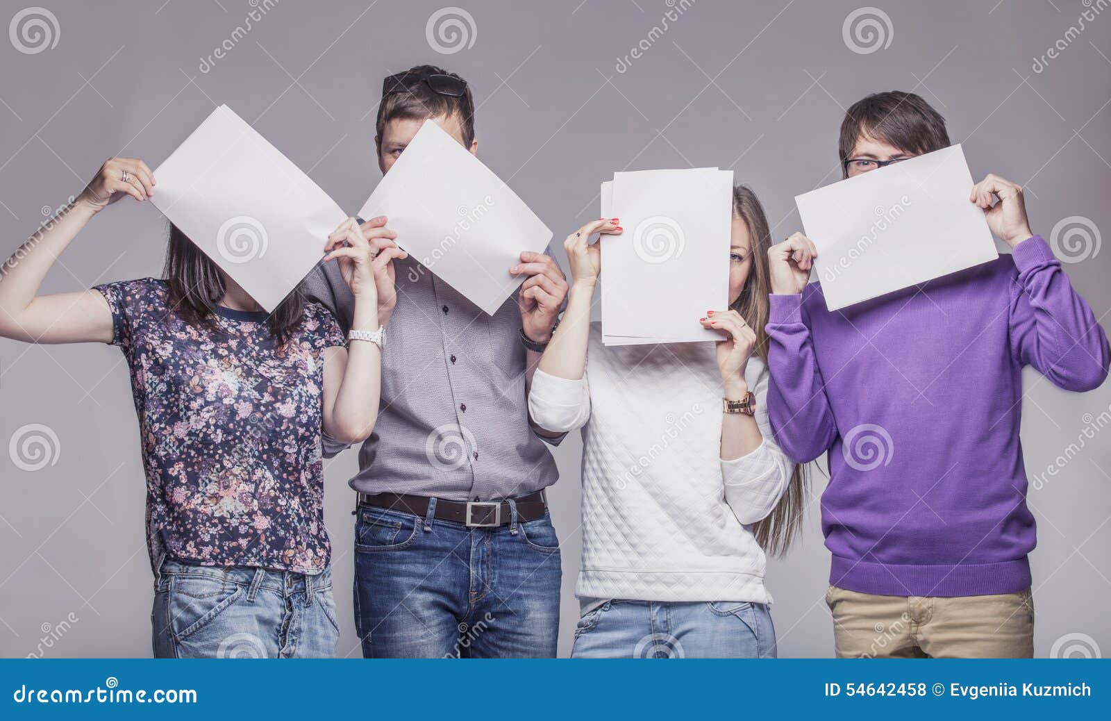 Group of Young Friends with Advert Board Stock Photo - Image of paper ...