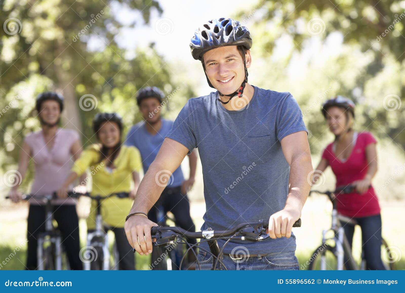 Group of Young Friends on Cycle Ride in Countryside Stock Photo - Image ...