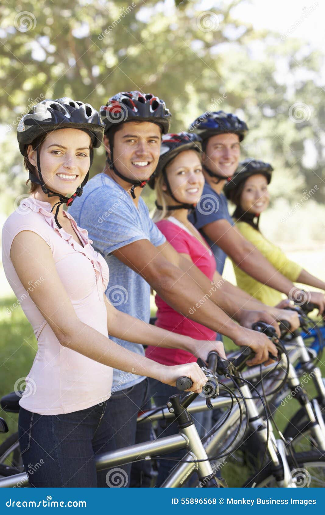 Group of Young Friends on Cycle Ride in Countryside Stock Photo - Image ...