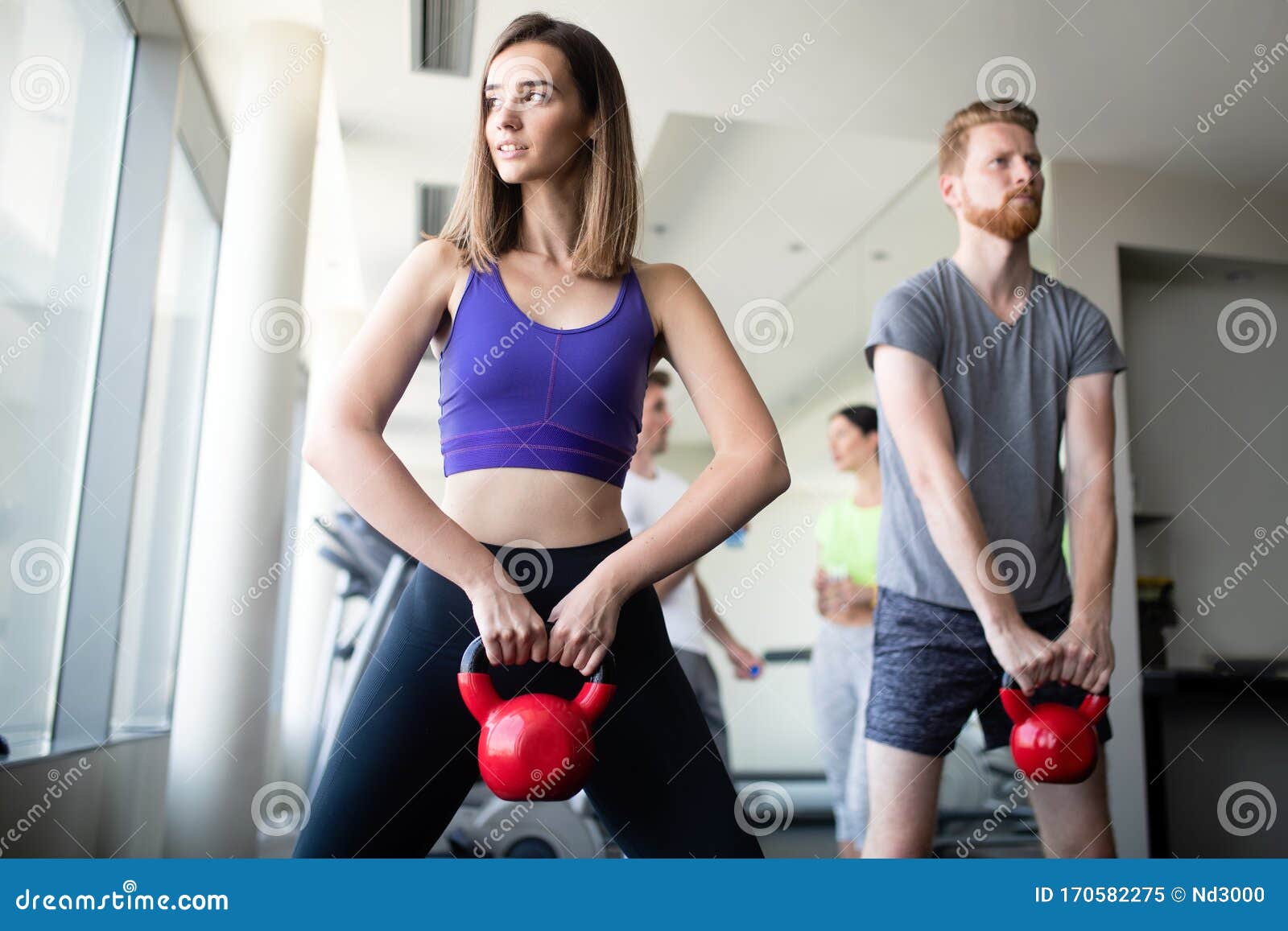 Group of Young Friends Doing Exercises in Gym Stock Image - Image of ...
