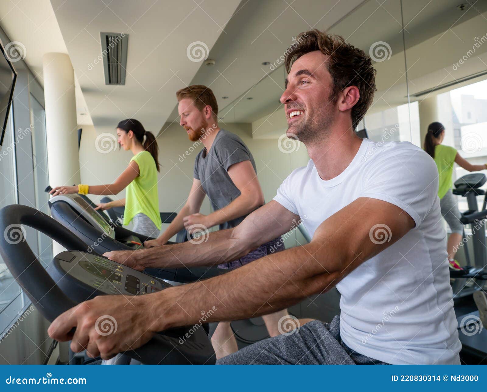 Group of Young Friends Doing Exercises in Gym Stock Photo - Image of ...