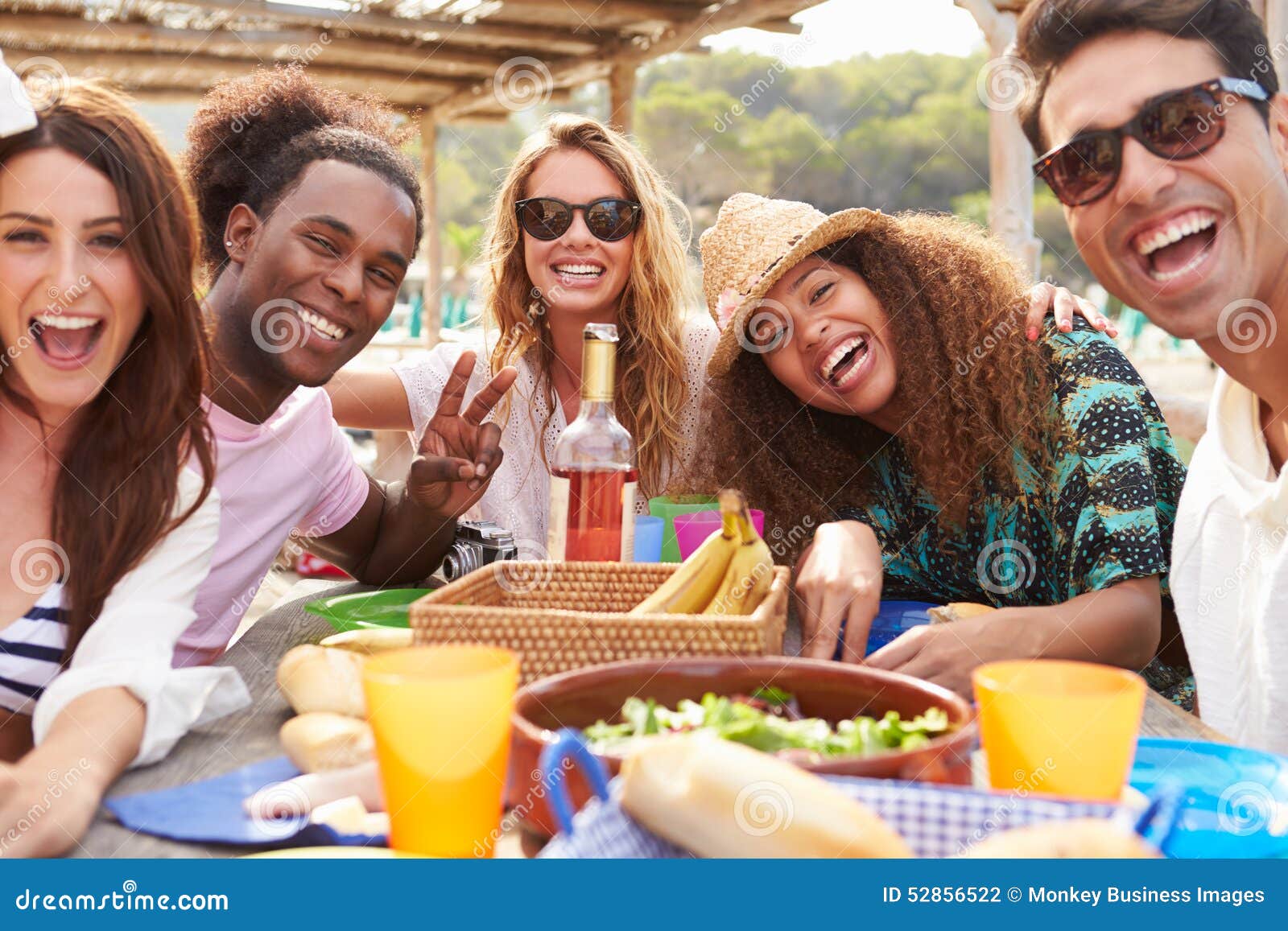 Group of Young Friends Enjoying Lunch Outdoors Stock Photo - Image of ...