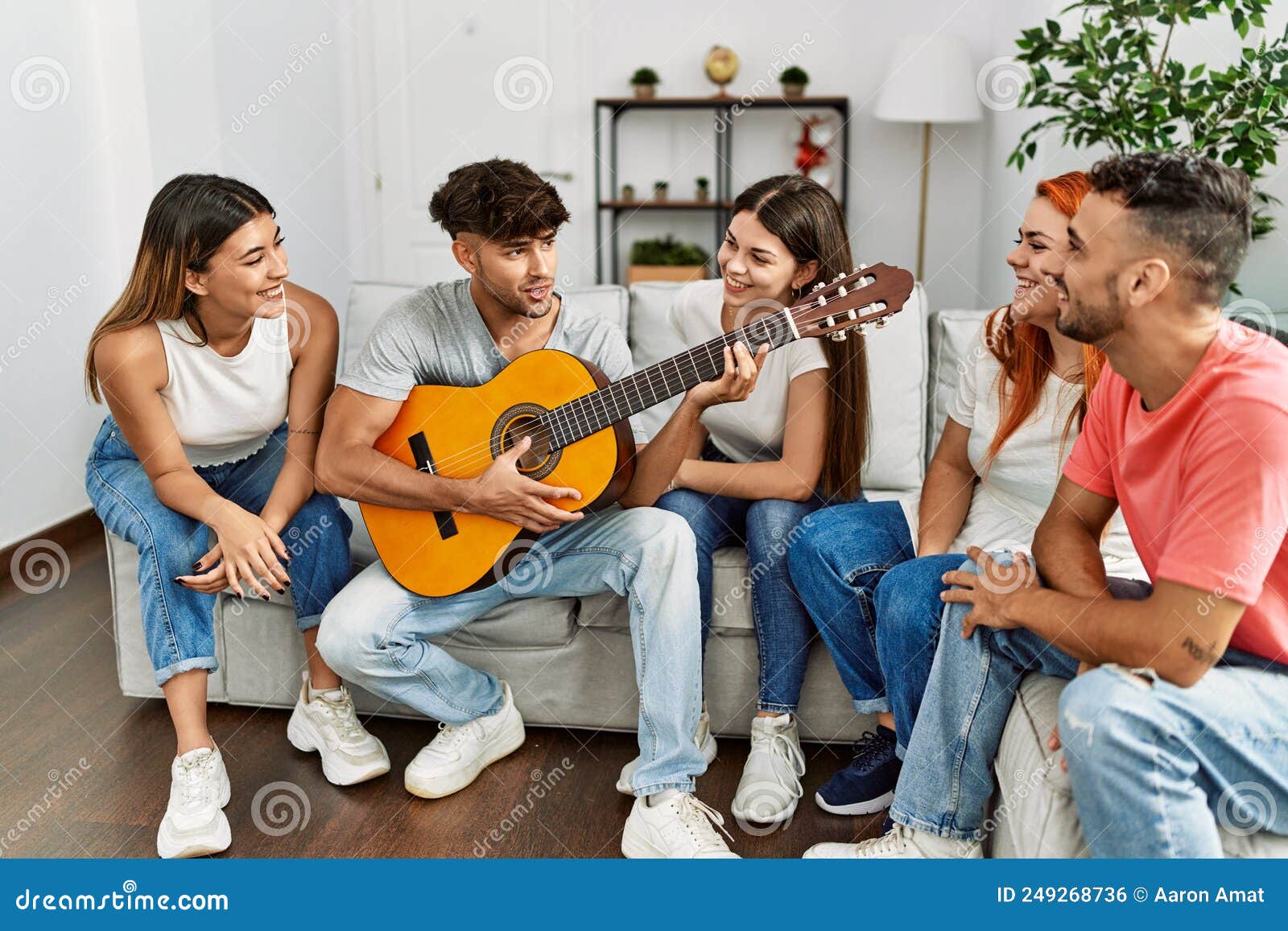 Group of Young Friends Having Party Playing Guitar at Home Stock Photo ...