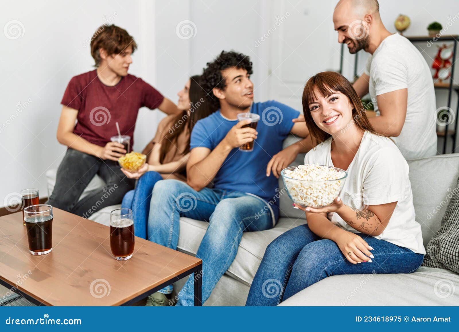 Group of Young Friends Having Party Sitting on the Sofa at Home Stock ...