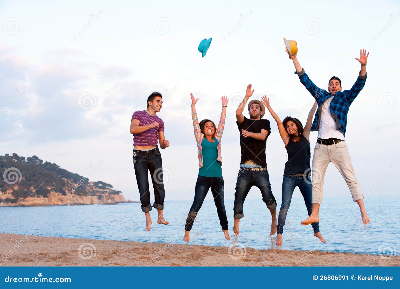 Group of Young Friends Jumping on Beach. Stock Image - Image of ...