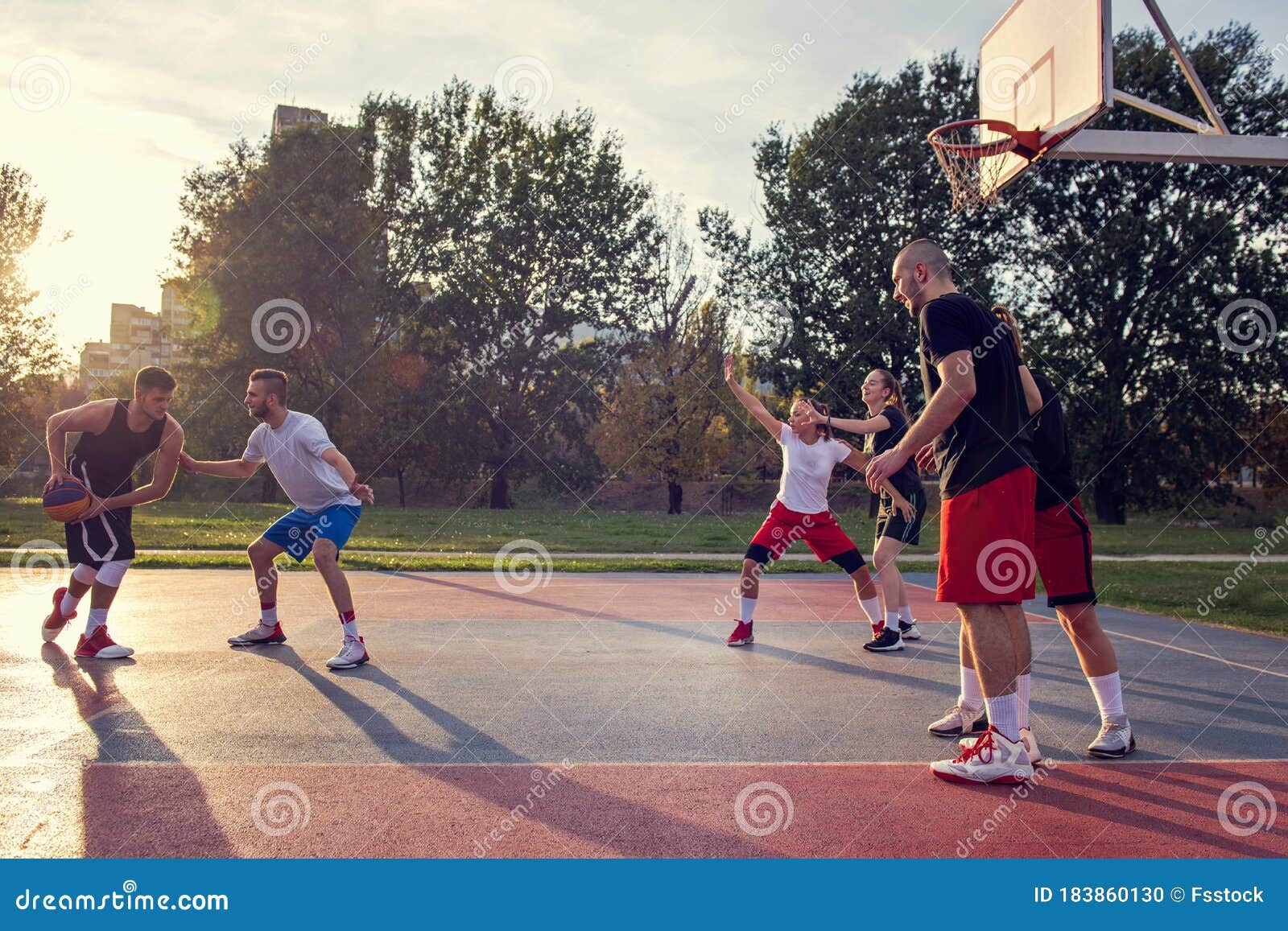 Group of Young Friends Playing Basketball Match Stock Photo - Image of ...