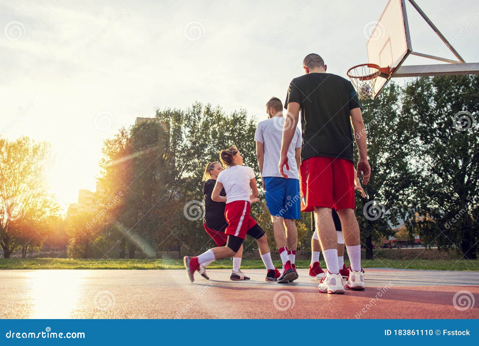 Group of Young Friends Playing Basketball Match Stock Photo - Image of ...