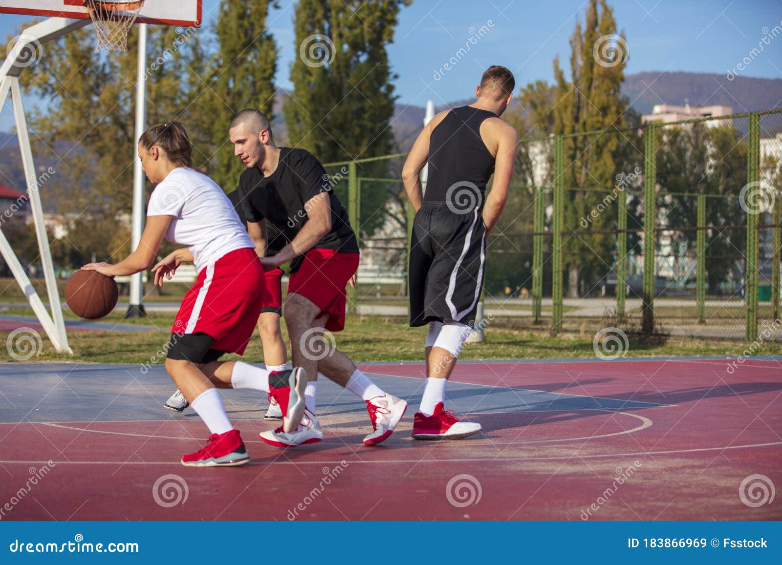 Group of Young Friends Playing Basketball Match Stock Image - Image of ...