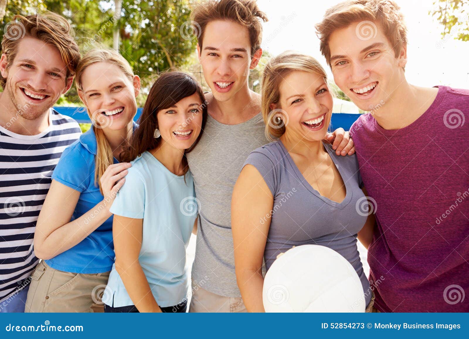 Group of Young Friends Playing Volleyball Match Stock Image - Image of ...