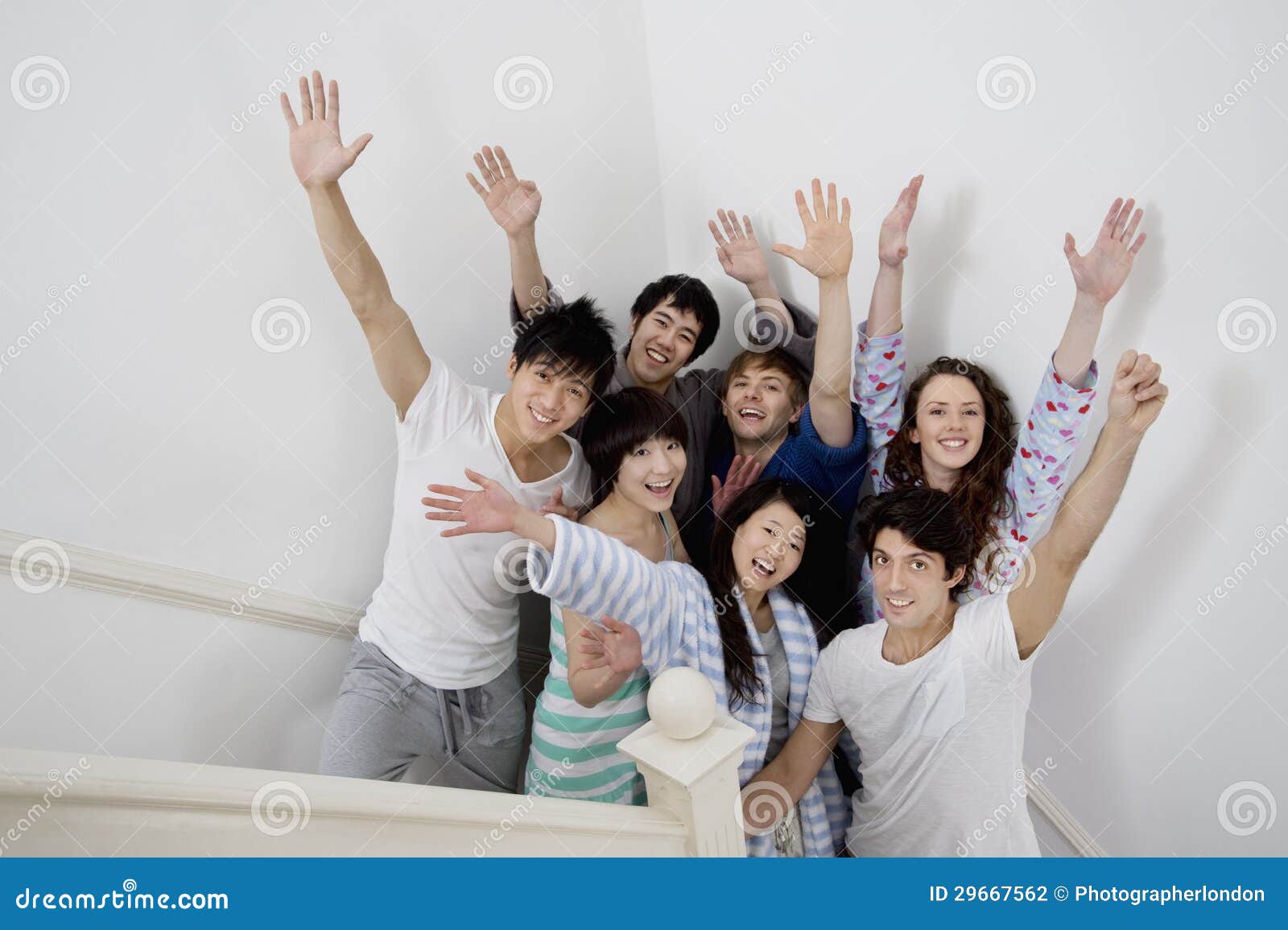 Group of Young Friends Raising Arms Stock Photo - Image of people ...