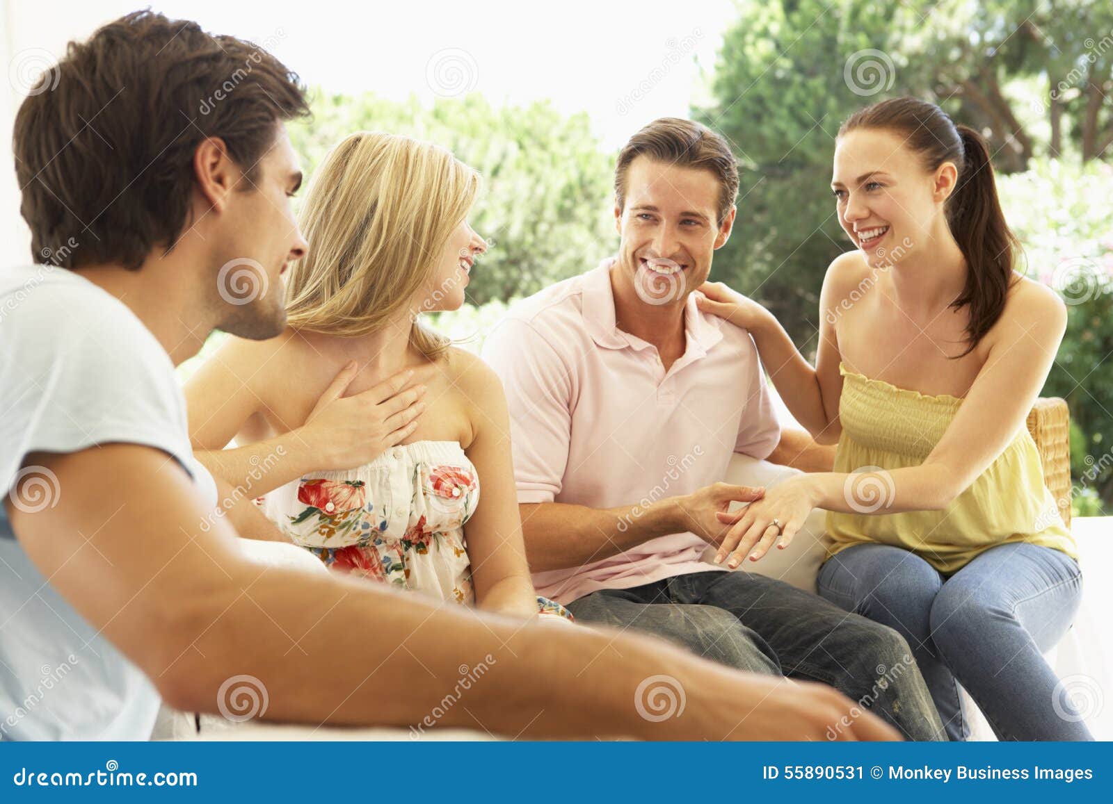 Group of Young Friends Relaxing on Sofa Stock Image - Image of holding ...