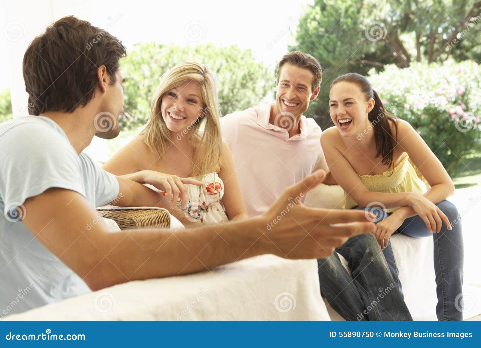 Group of Young Friends Relaxing on Sofa Stock Photo - Image of twenties ...