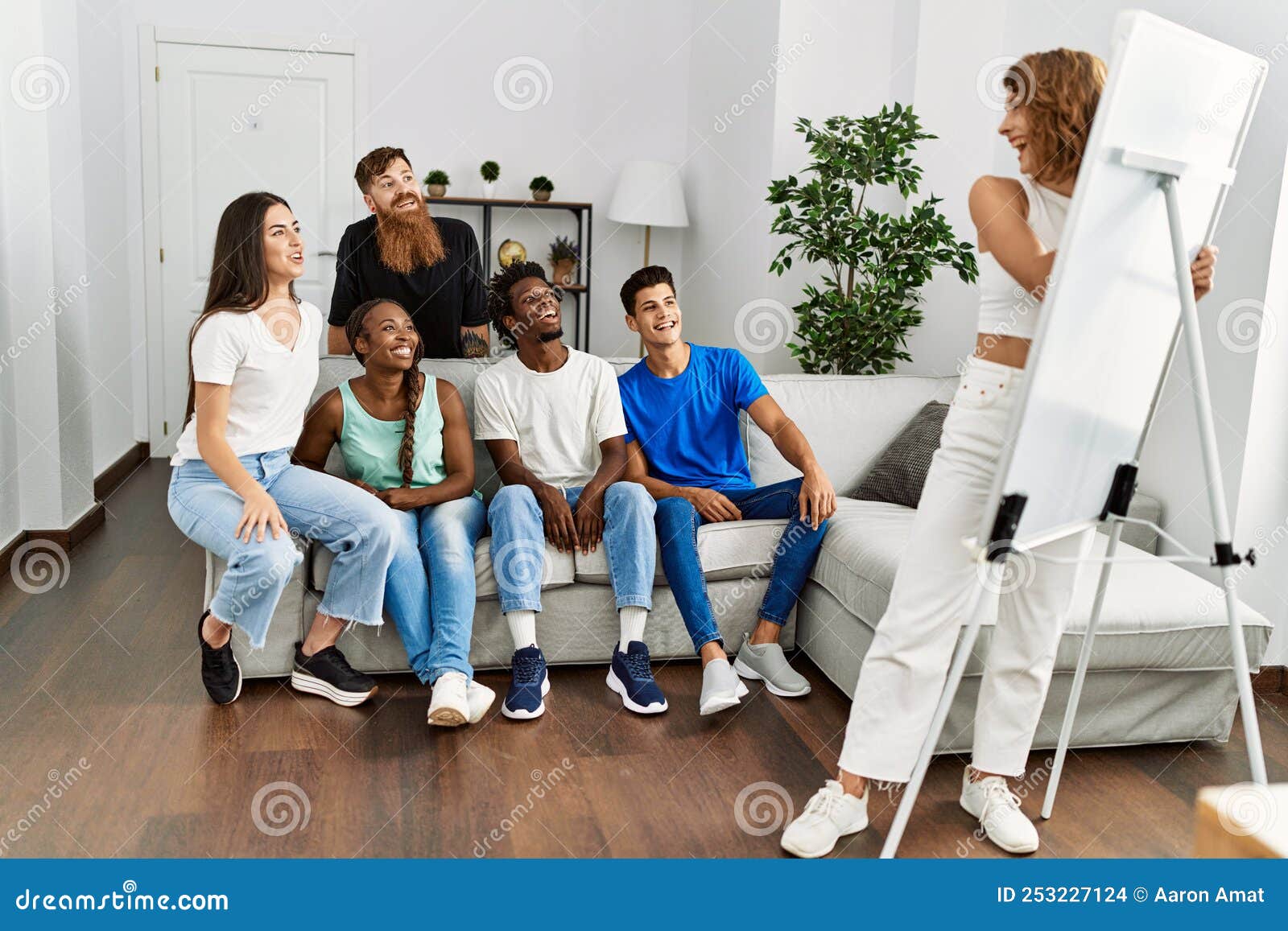 Group of Young Friends Smiling Happy Playing Drawing Game at Home Stock ...