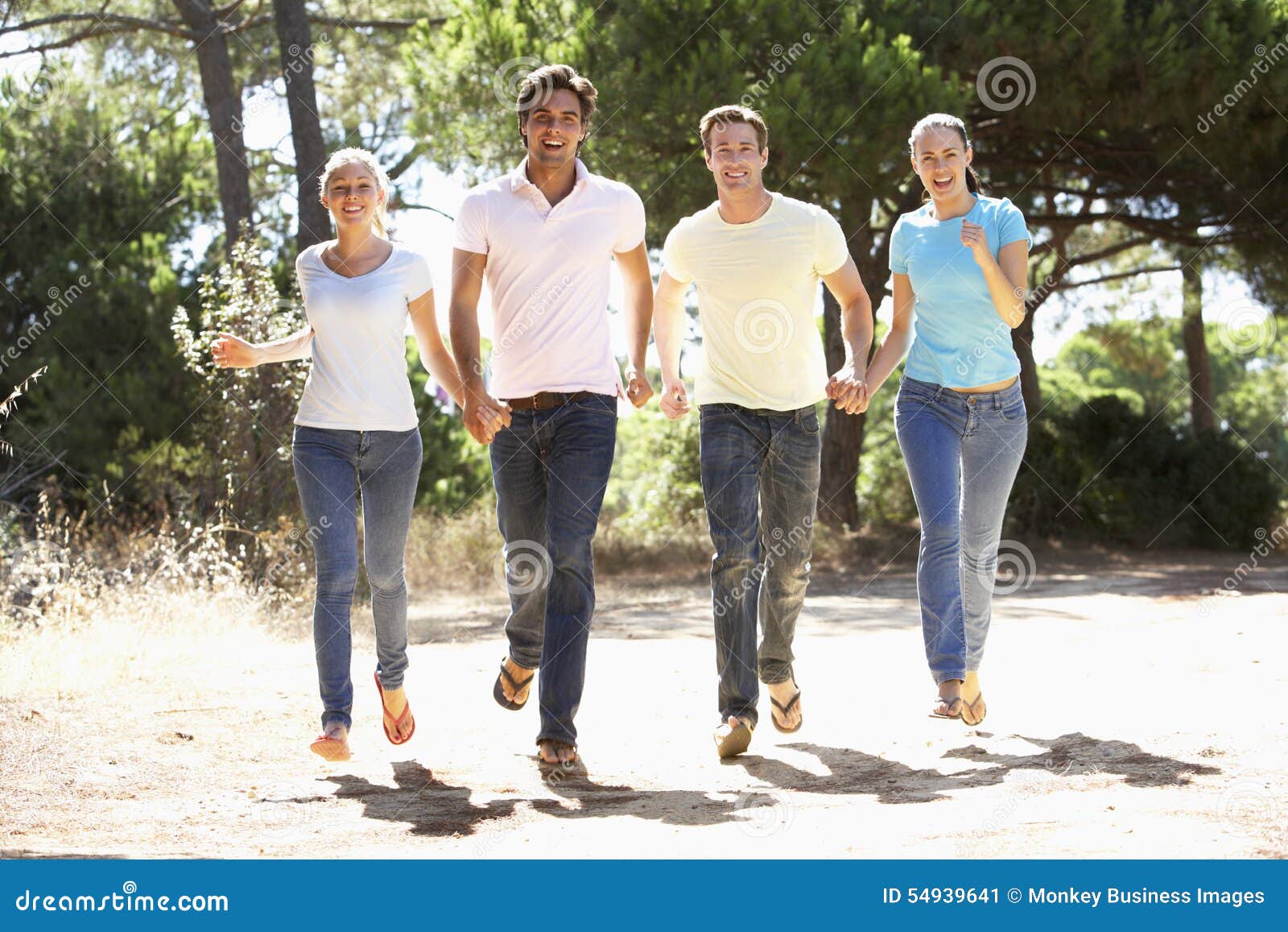 Group of Young Friends on Walk in Countryside Stock Image - Image of ...