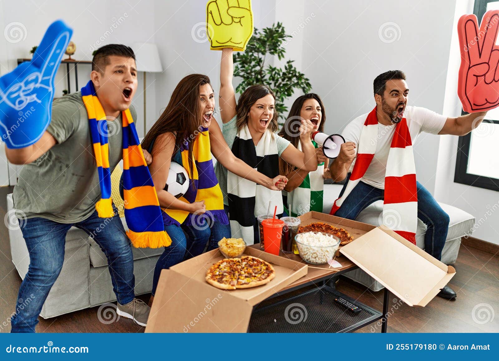 Group of Young Friends Watching and Supporting Soccer Match at Home ...