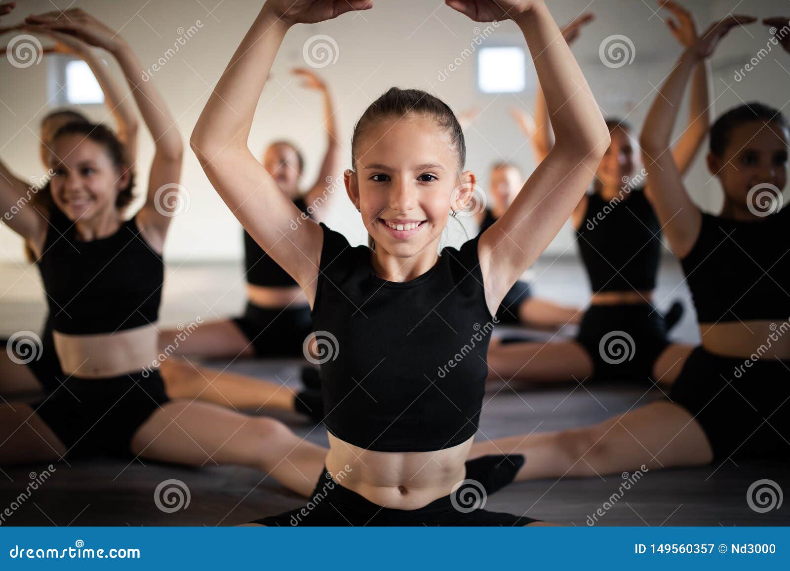 Group of Young Girls Practicing and Exercising Modern Ballet Dance ...