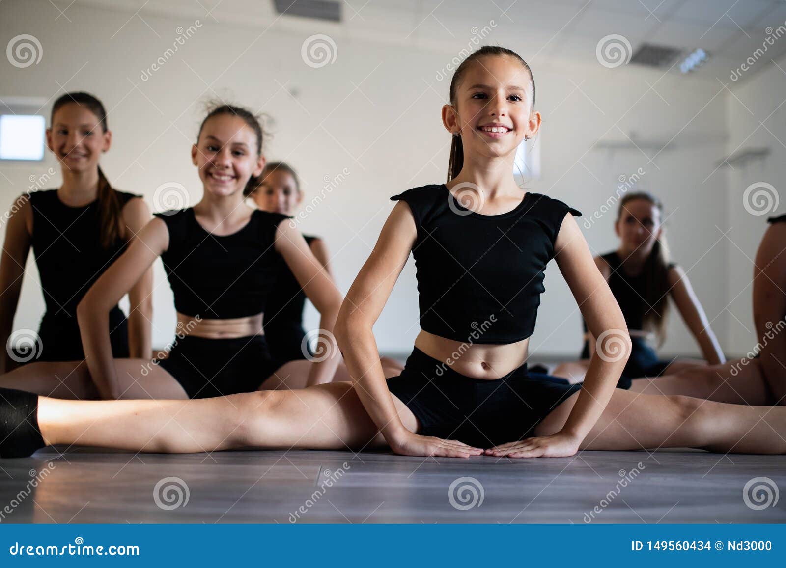 Group of Young Girls Practicing and Exercising Modern Ballet Dance ...