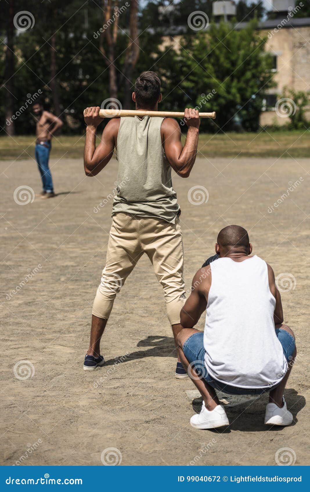 Young Handsome Men Playing Baseball on Court Stock Photo - Image of ...