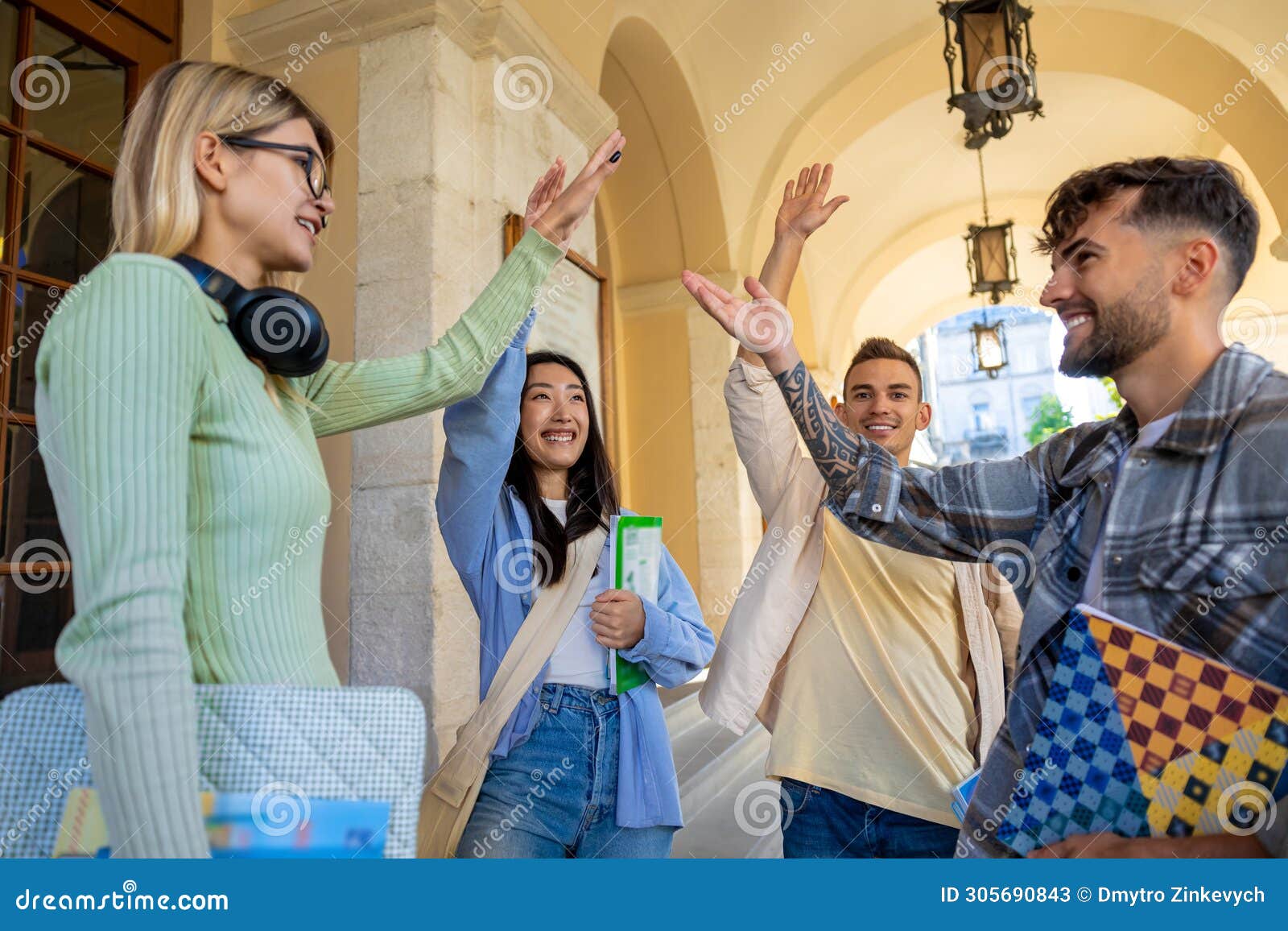 Young Happy Students Having Fun Together Outside University Giving High ...