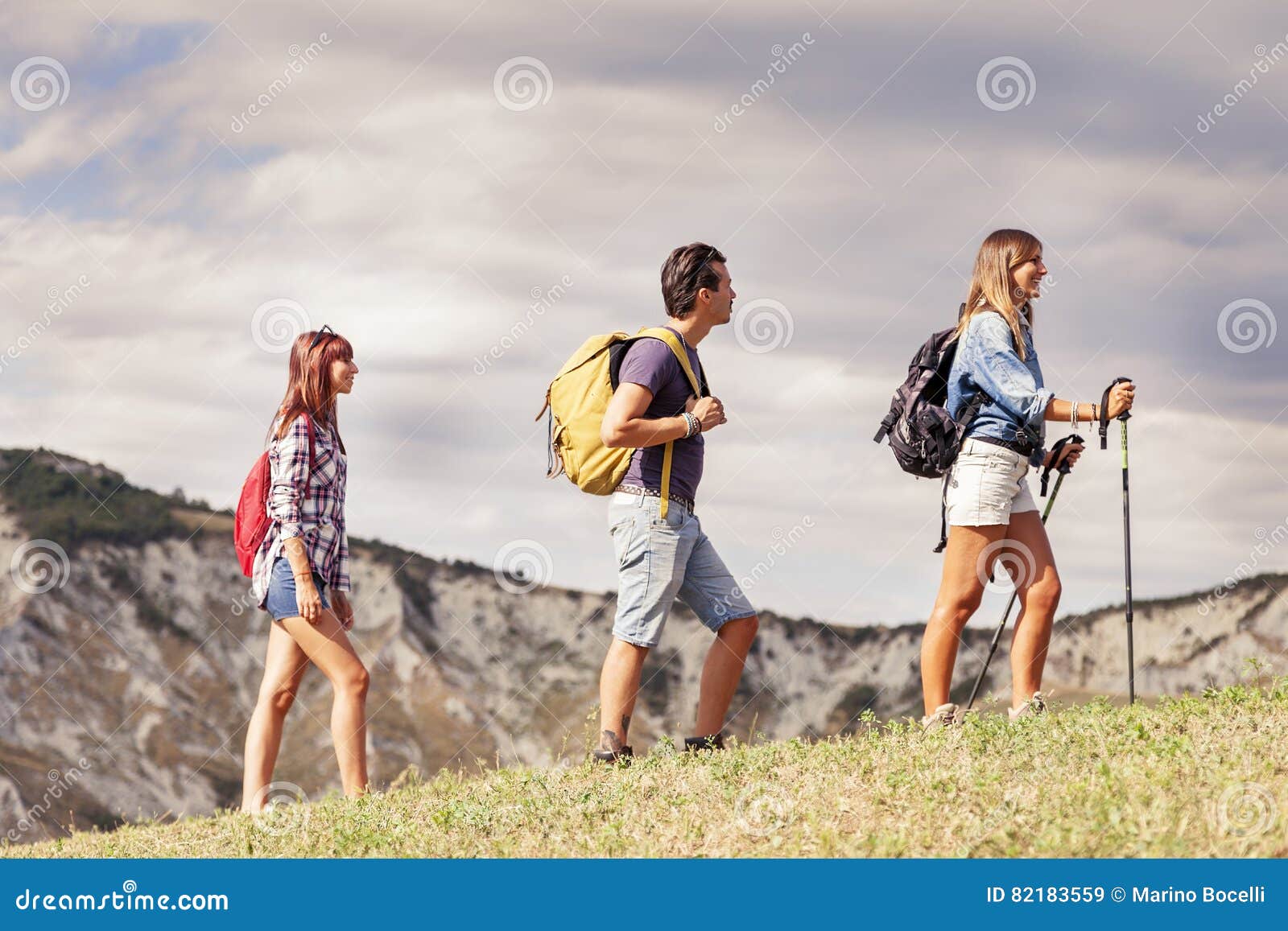 Group of Young Hikers in the Mountain in Single File Stock Image ...