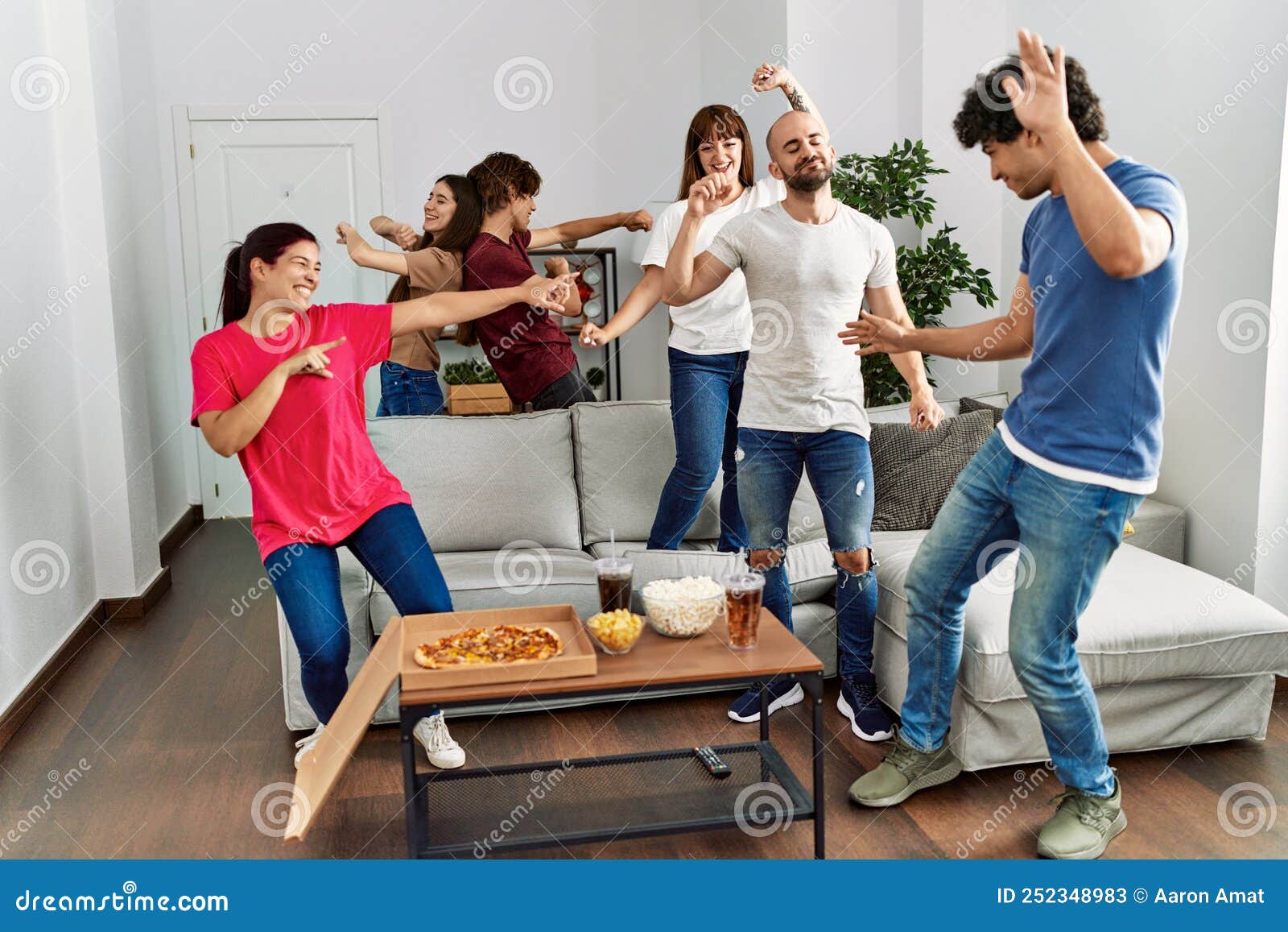 Group of Young Hispanic Friends Having Party Dancing at Home Stock ...