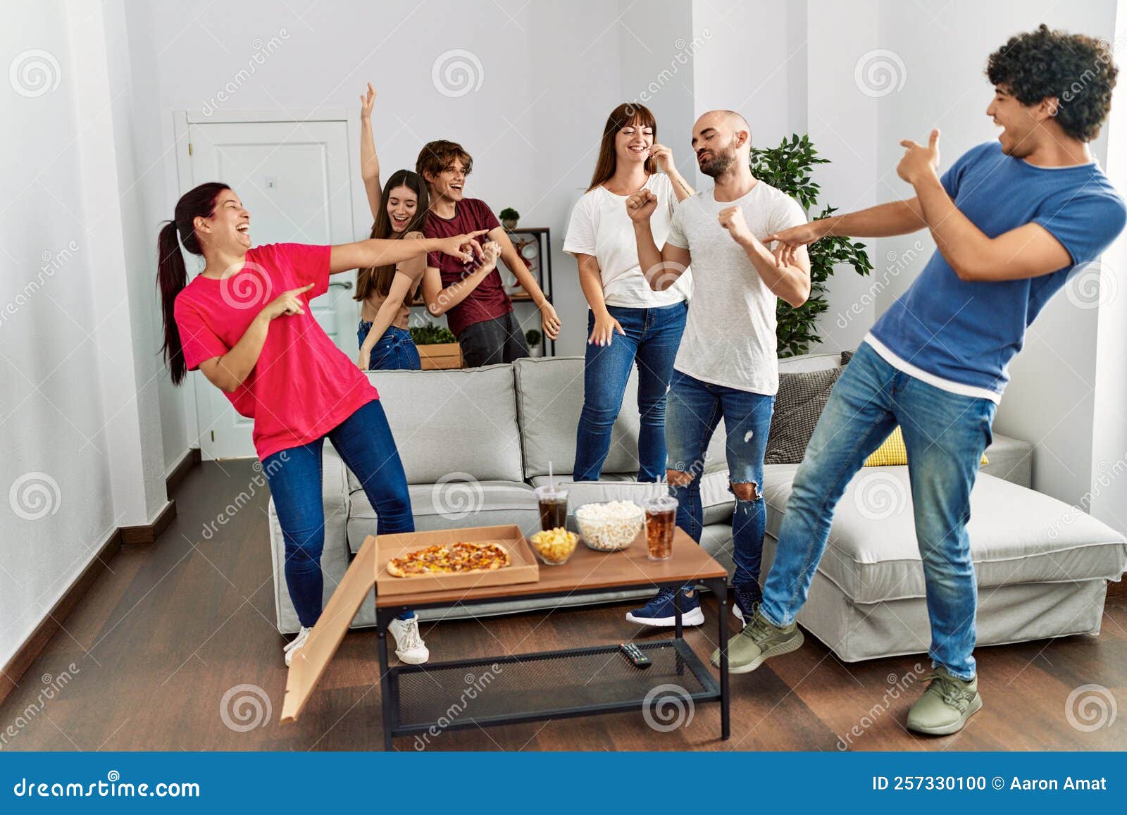 Group of Young Hispanic Friends Having Party Dancing at Home Stock ...