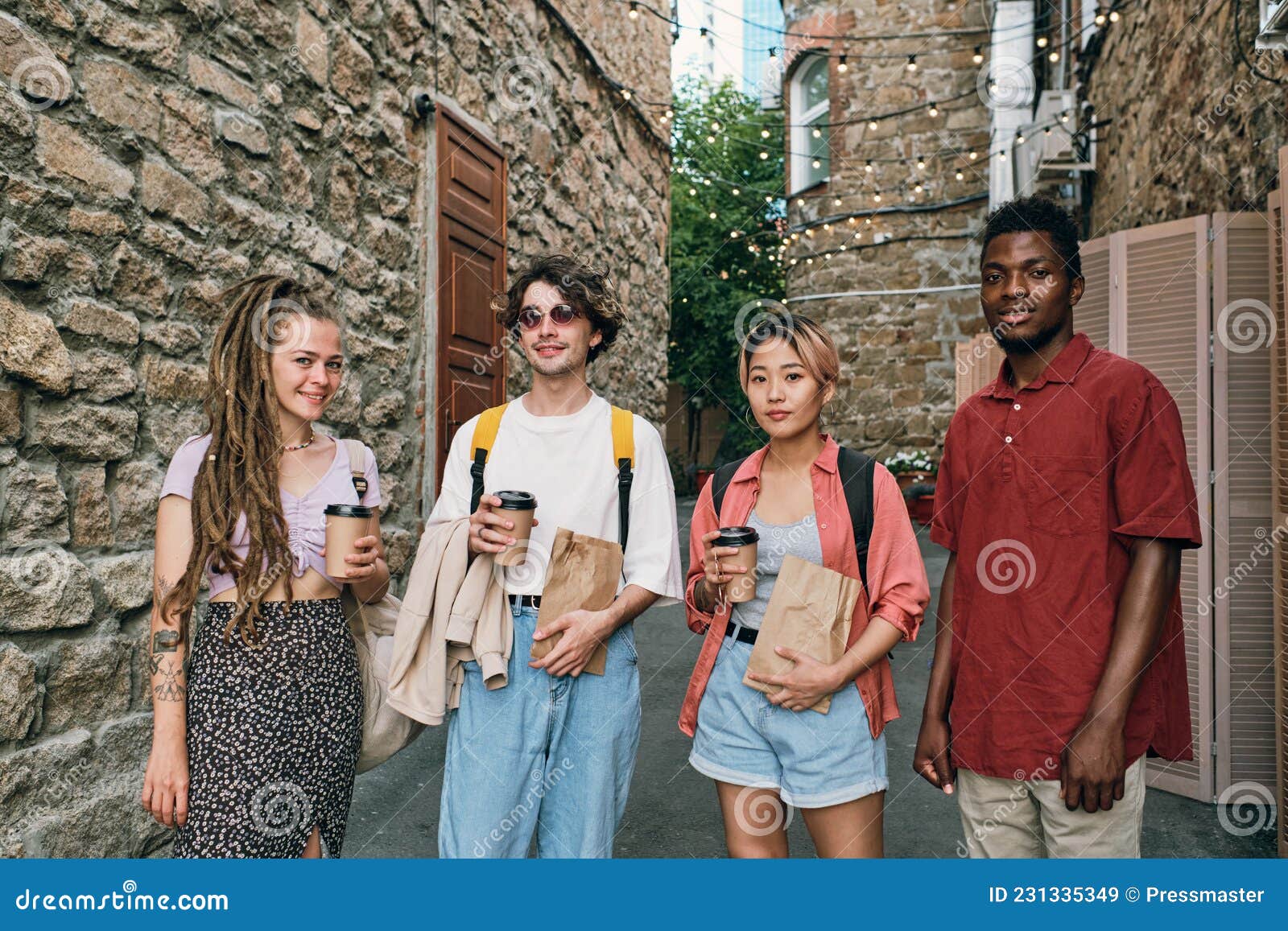 Group of Young Intercultural Friends with Drinks and Snacks Stock Image ...