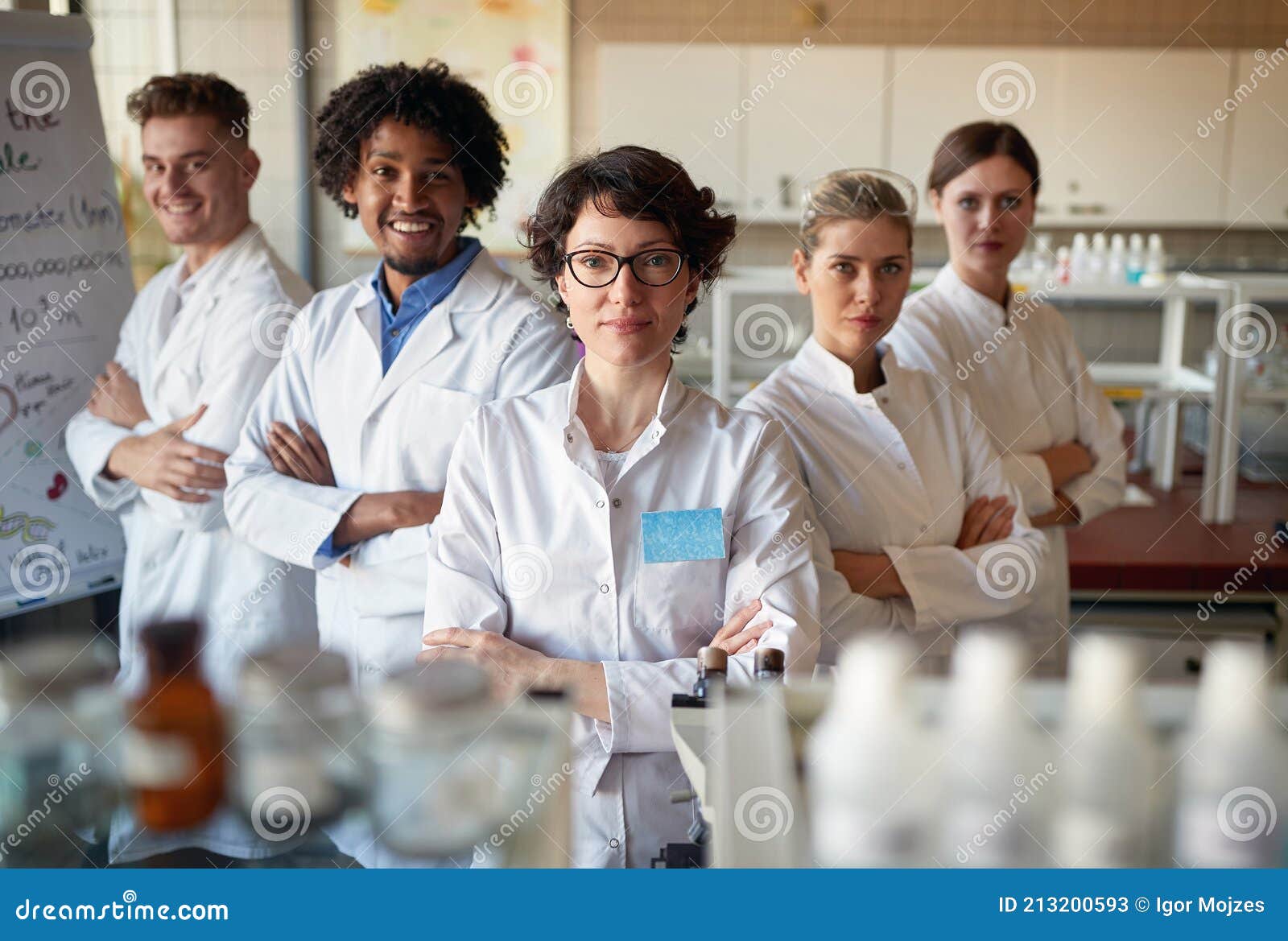 Group of Young Laboratory Technicians Stock Image - Image of caucasian ...