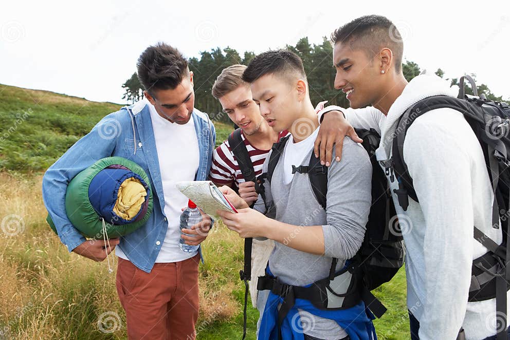 Group of Young Men on Camping Trip in Countryside Stock Photo - Image ...