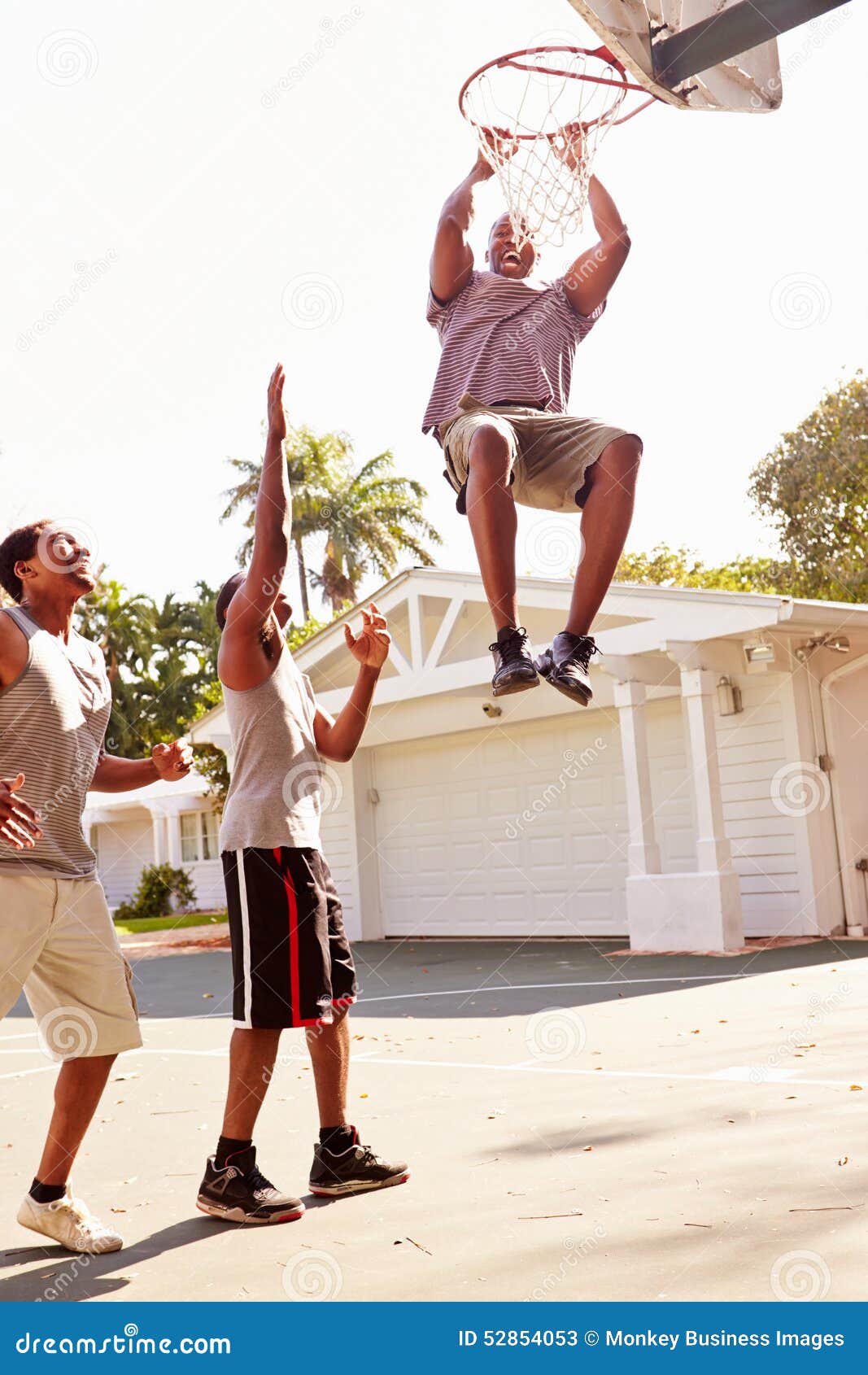 Group of Young Men Playing Basketball Match Stock Image - Image of ...