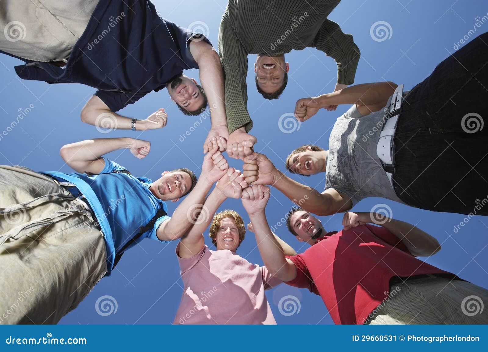 Group of Young Men Standing in Circle Stock Image - Image of ...