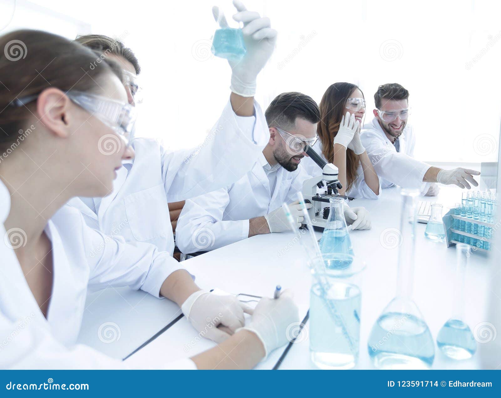Young Microbiologists Working in the Laboratory. Stock Photo - Image of ...