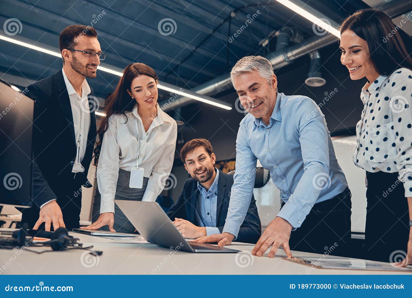 Group of Young Modern People in Formal Wear Communicating and Using ...