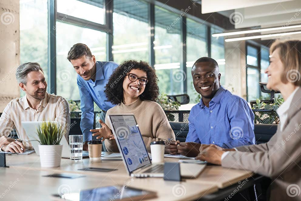 Group of Young Modern People Using Modern Technologies while Working in ...