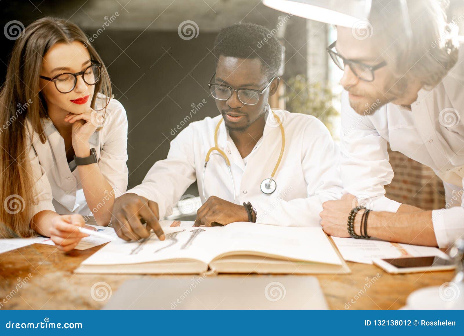 Young Phisicians Working in the Office Stock Photo - Image of adult ...