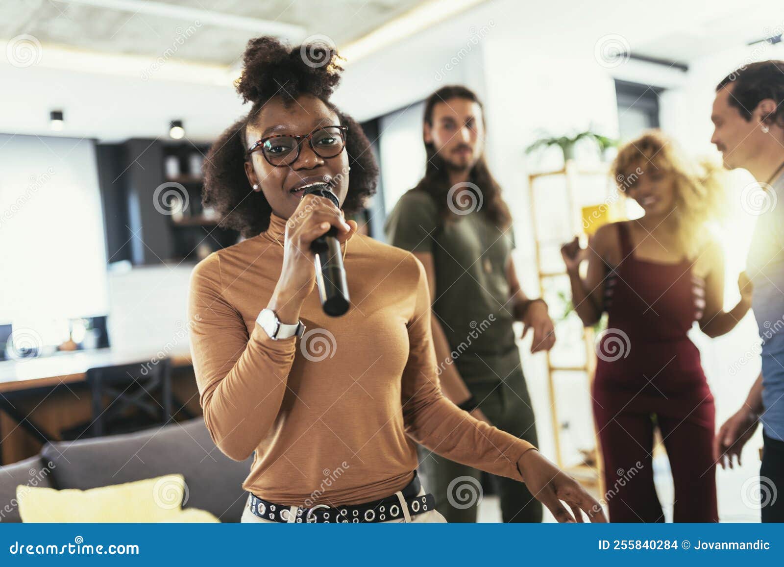 Young Multicultural Friends Having Party Singing Song Using Microphone ...