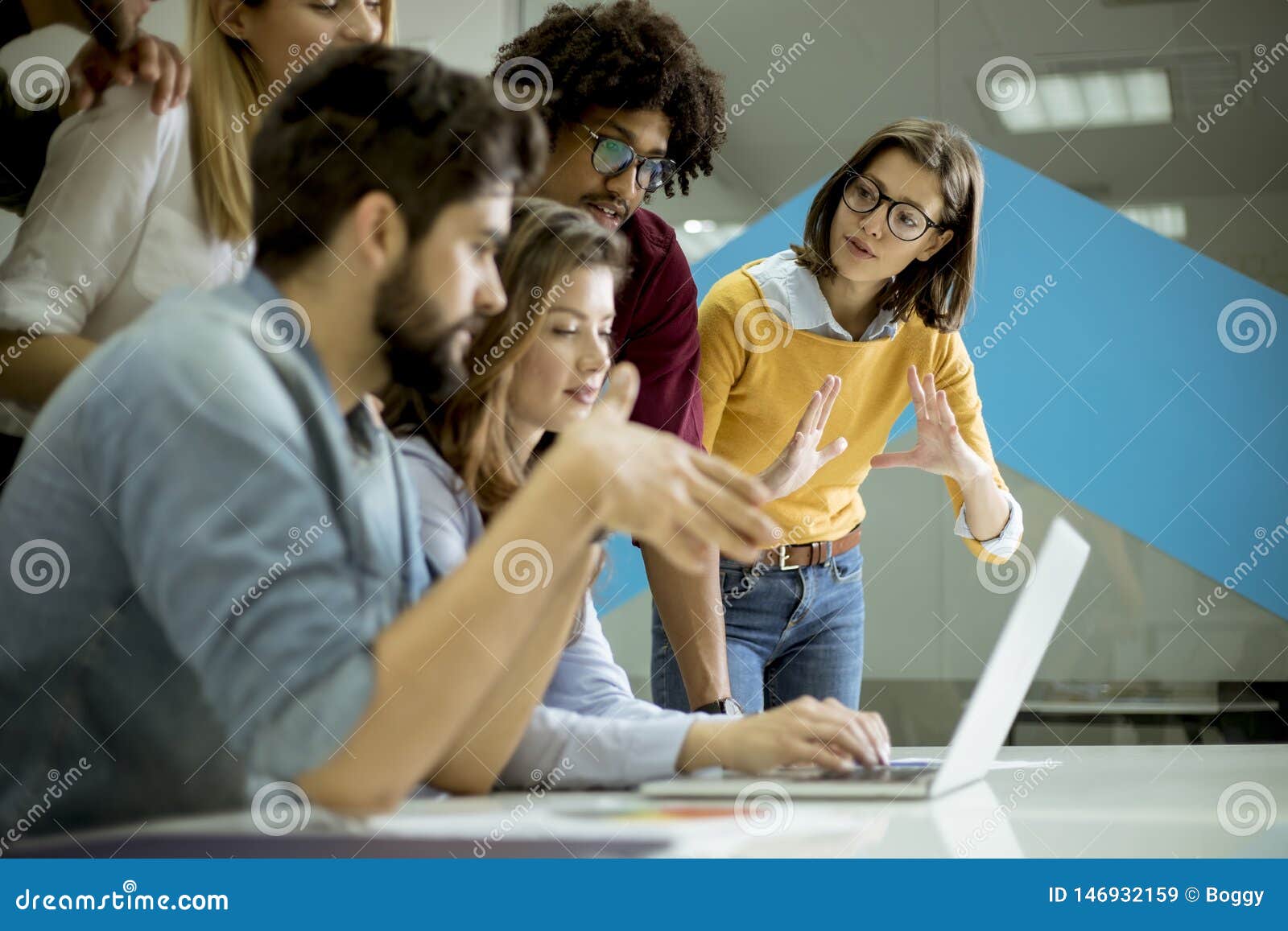 Group of Young Multiethnic Business People Working and Communicating ...