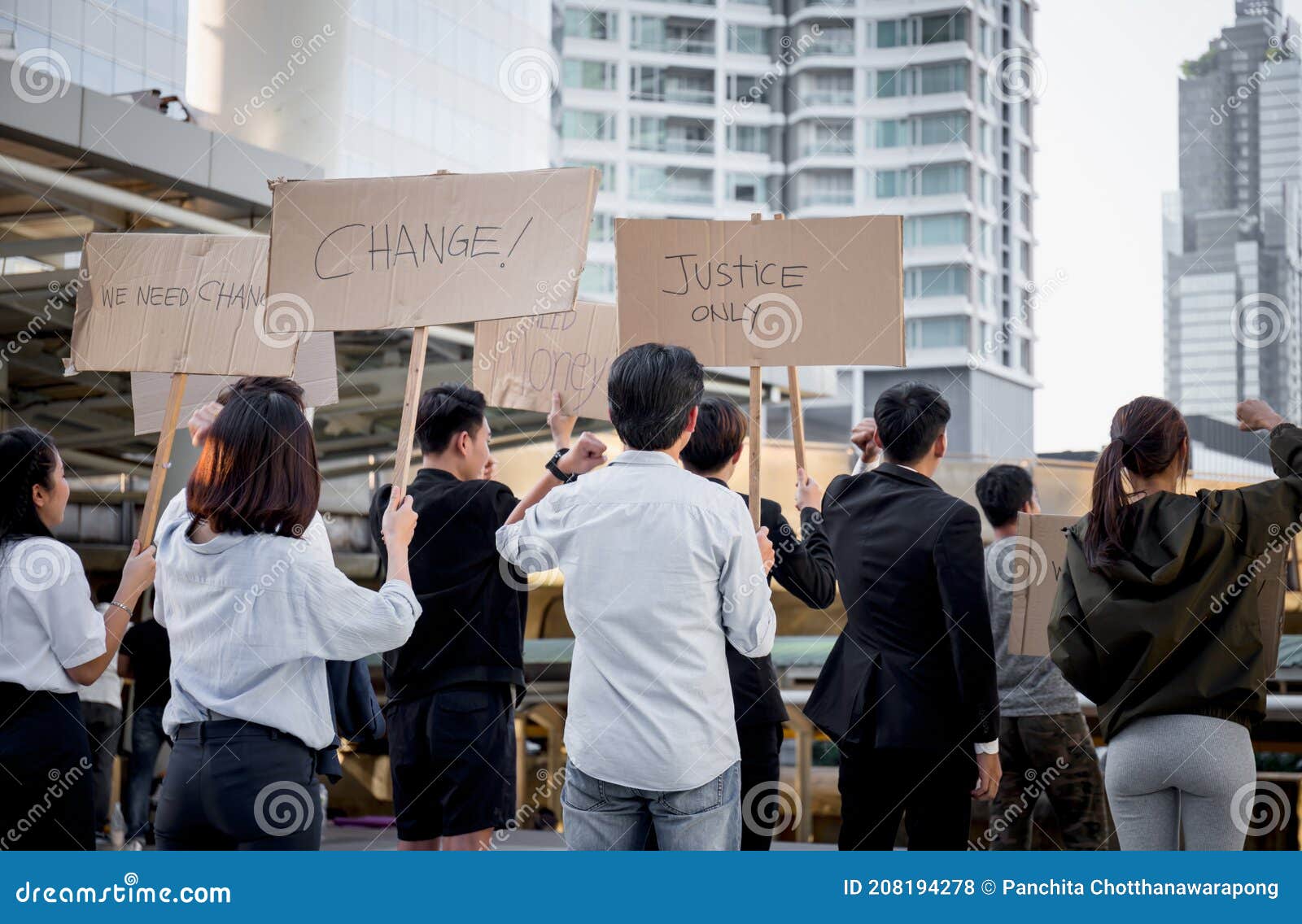 Group Of Young People Activists Is Protesting With Placards And Posters