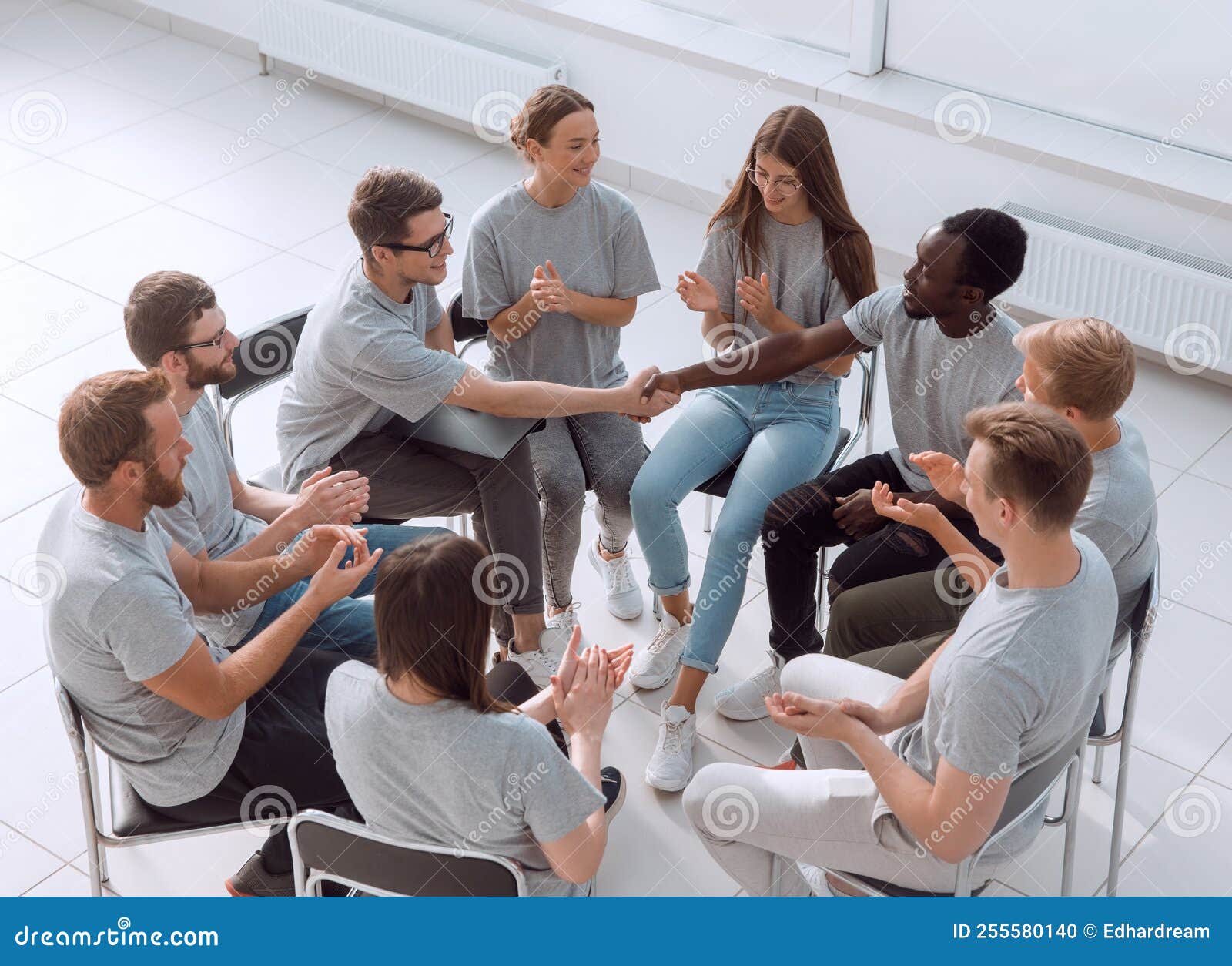 Group of Young People Applauding Their Comrades Stock Photo - Image of ...