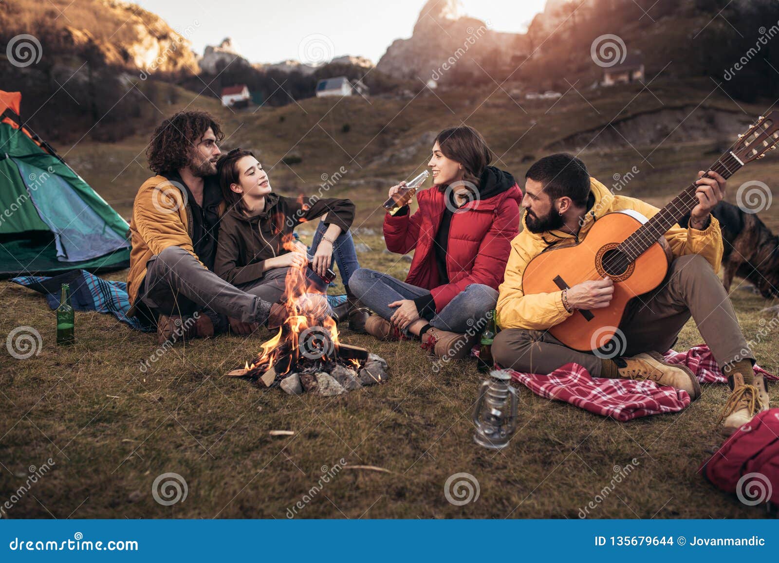 Group of Young People Around Camp Fire Stock Photo - Image of adult ...