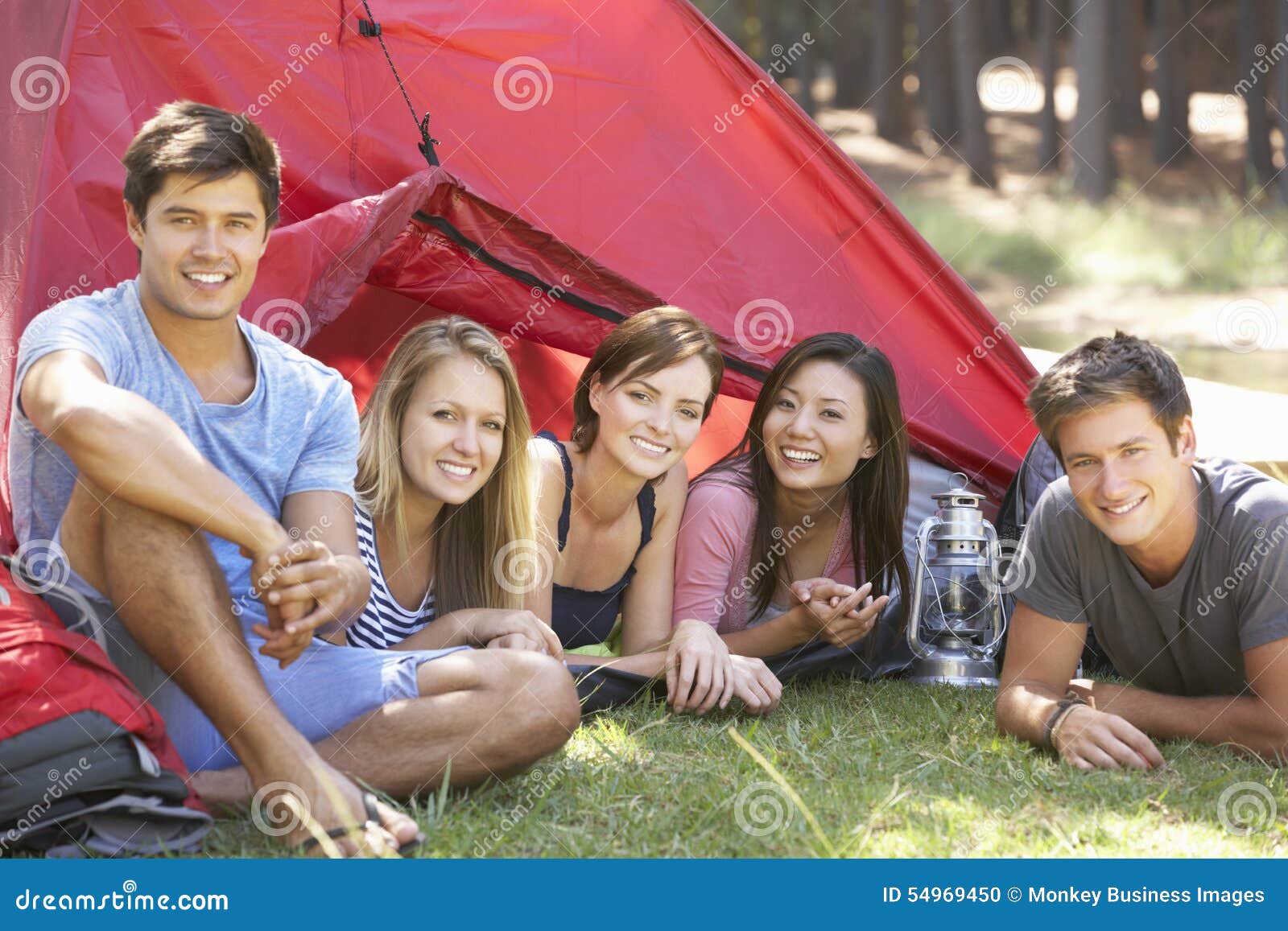Group of Young People on Camping Holiday Together Stock Photo - Image ...