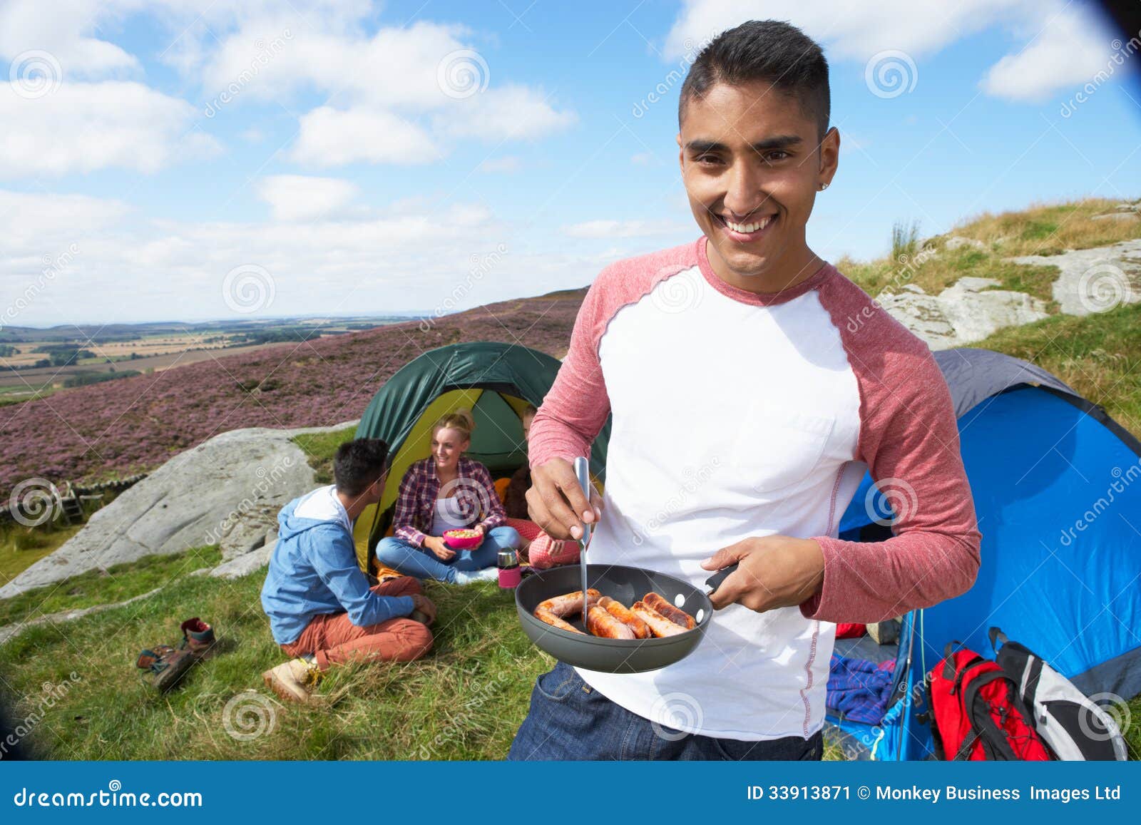 Group of Young People on Camping Trip in Countryside Stock Image ...