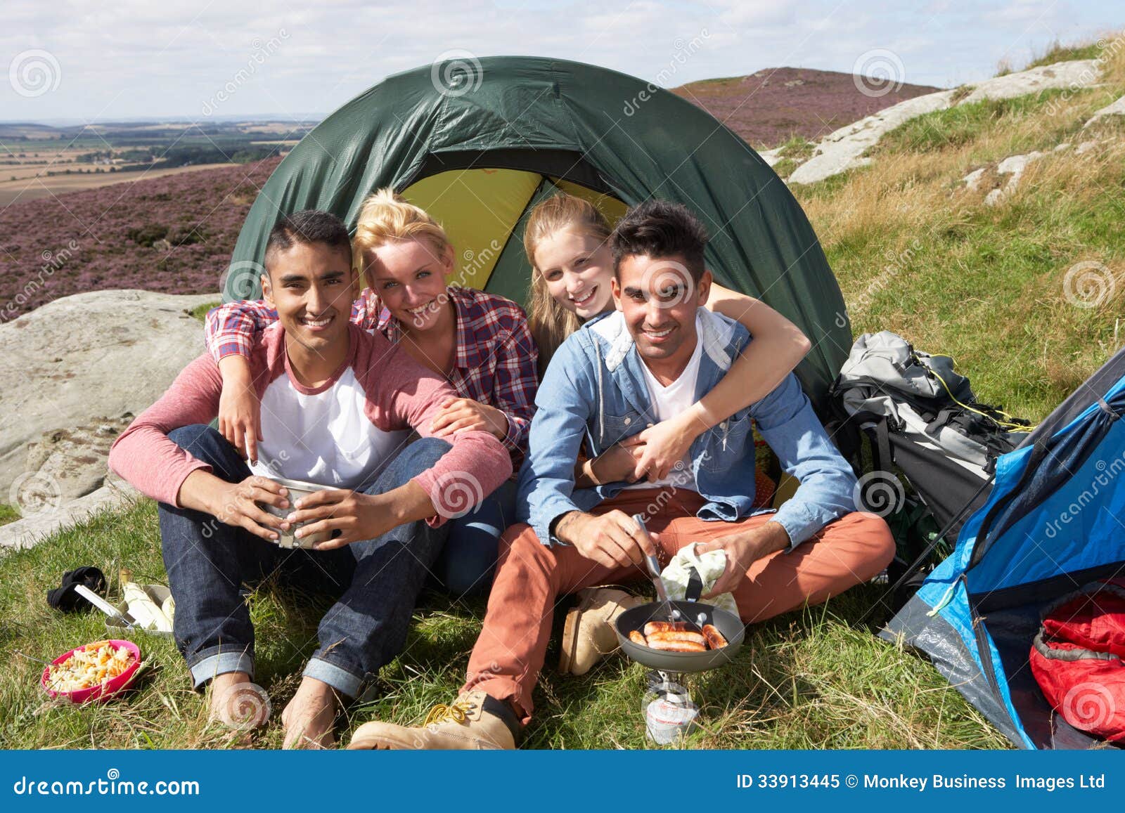 Group of Young People on Camping Trip in Countryside Stock Image ...