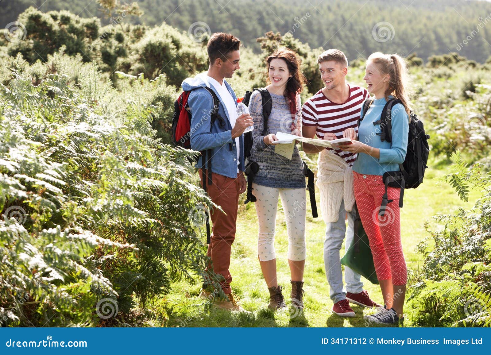 Group of Young People on Camping Trip in Countryside Stock Photo ...