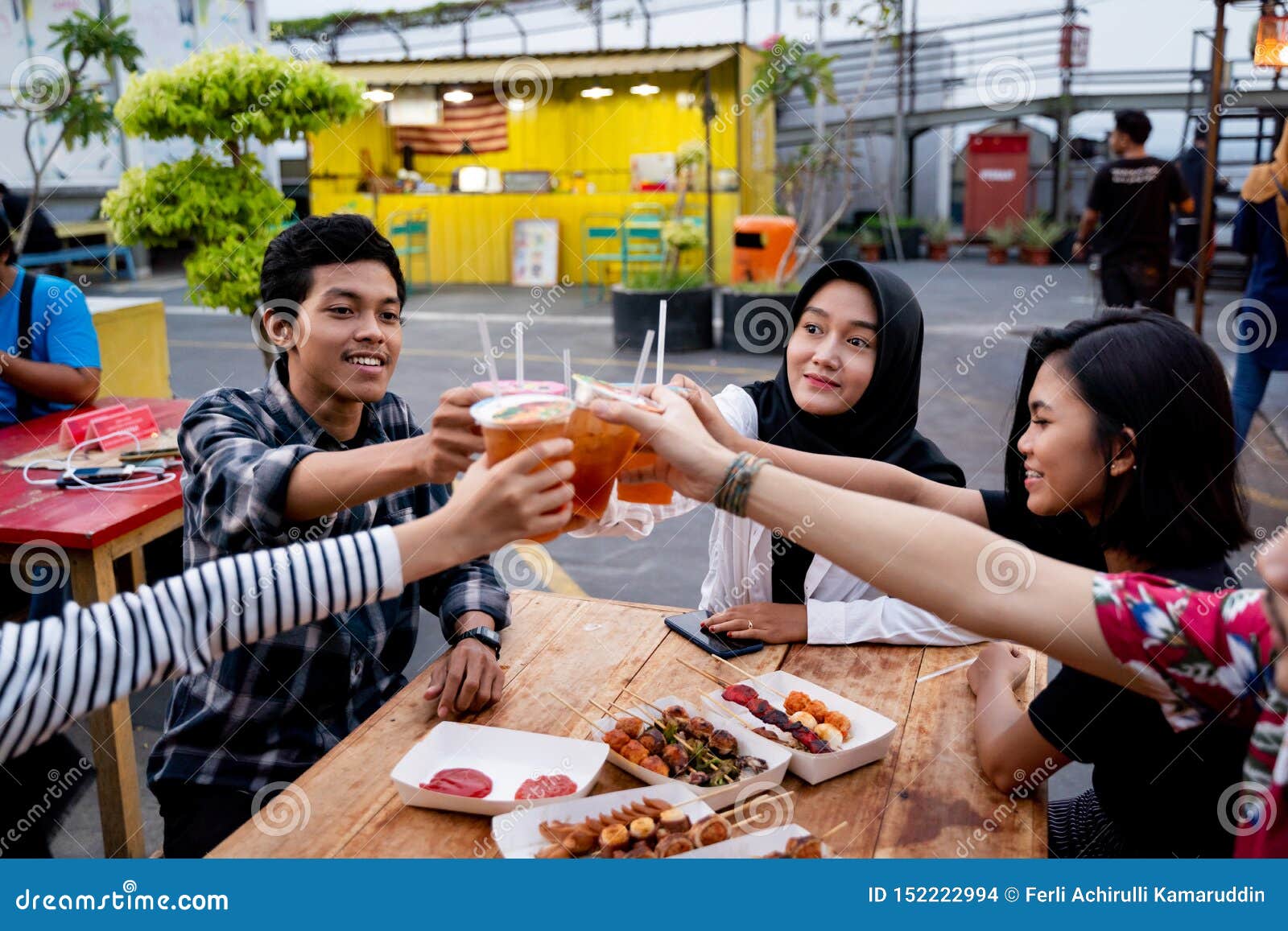 Group of Young People Cheers Drinks Stock Photo - Image of pretty, meal ...