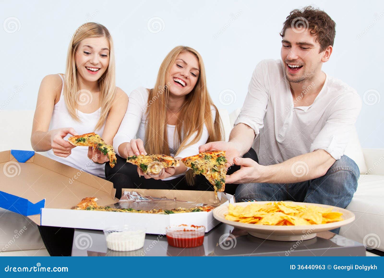 Group of Young People Eating Pizza at Home Stock Image - Image of ...