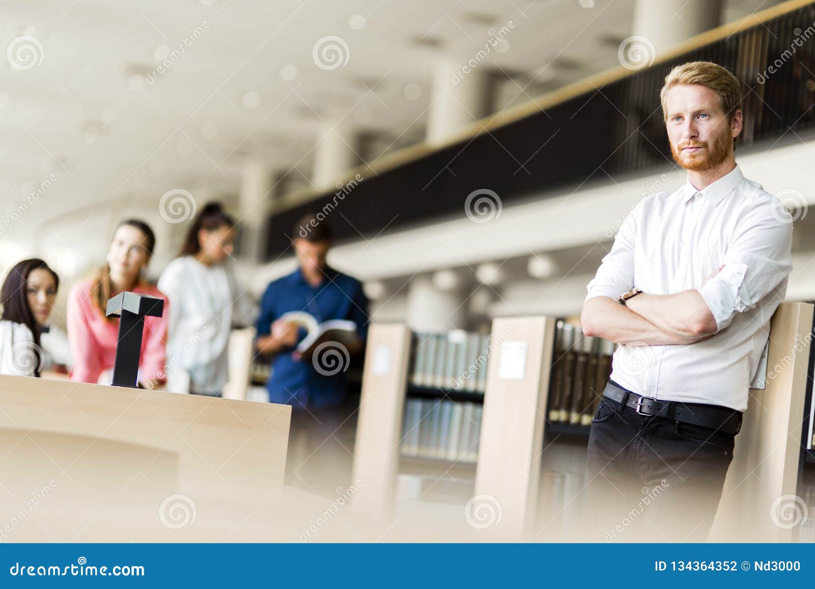 Group of Young People Educating Themselves in a Library Stock Photo ...