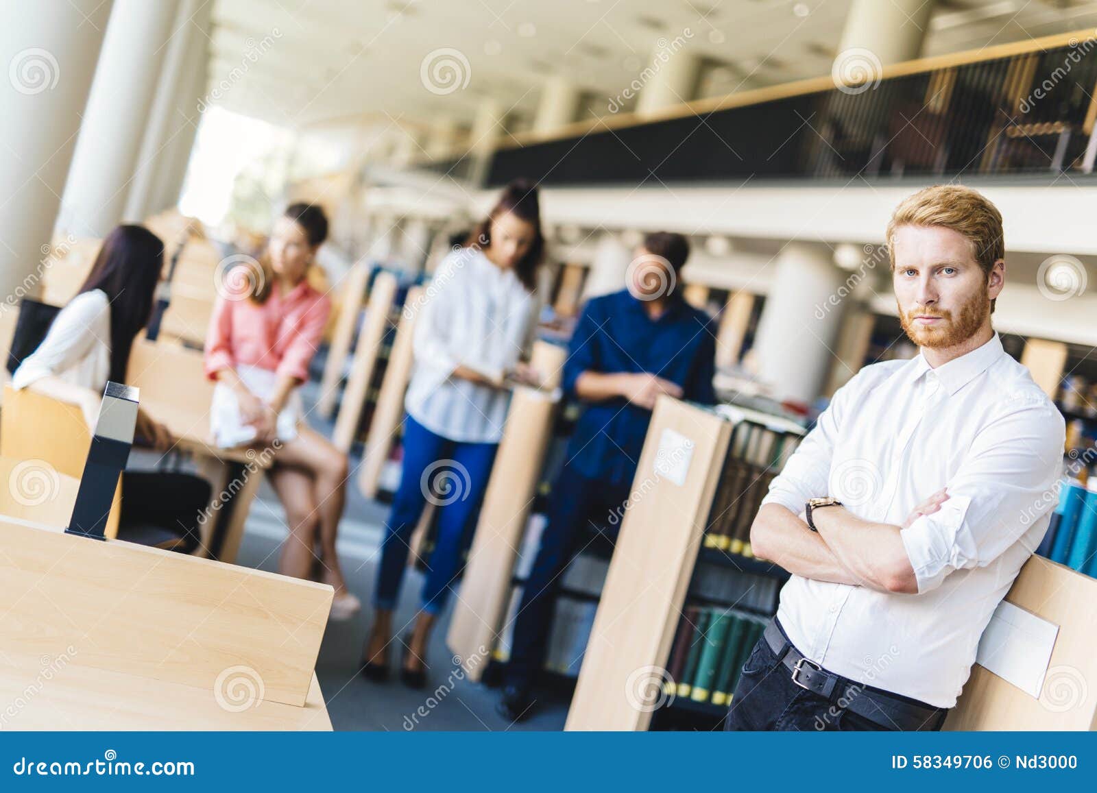 Group of Young People Educating Themselves in a Library Stock Photo ...